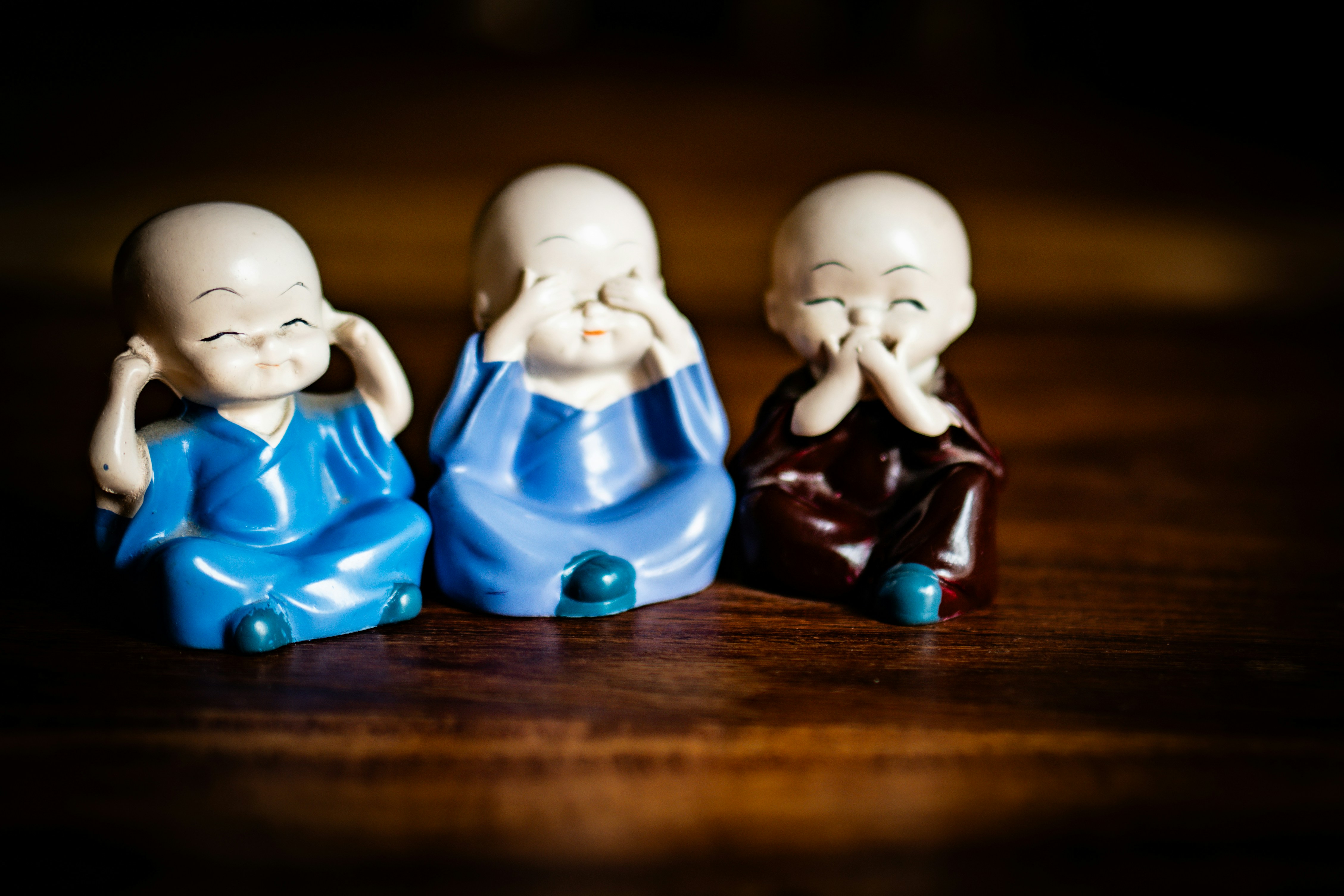 Three Silent Buddhas on a Warmwood Stage