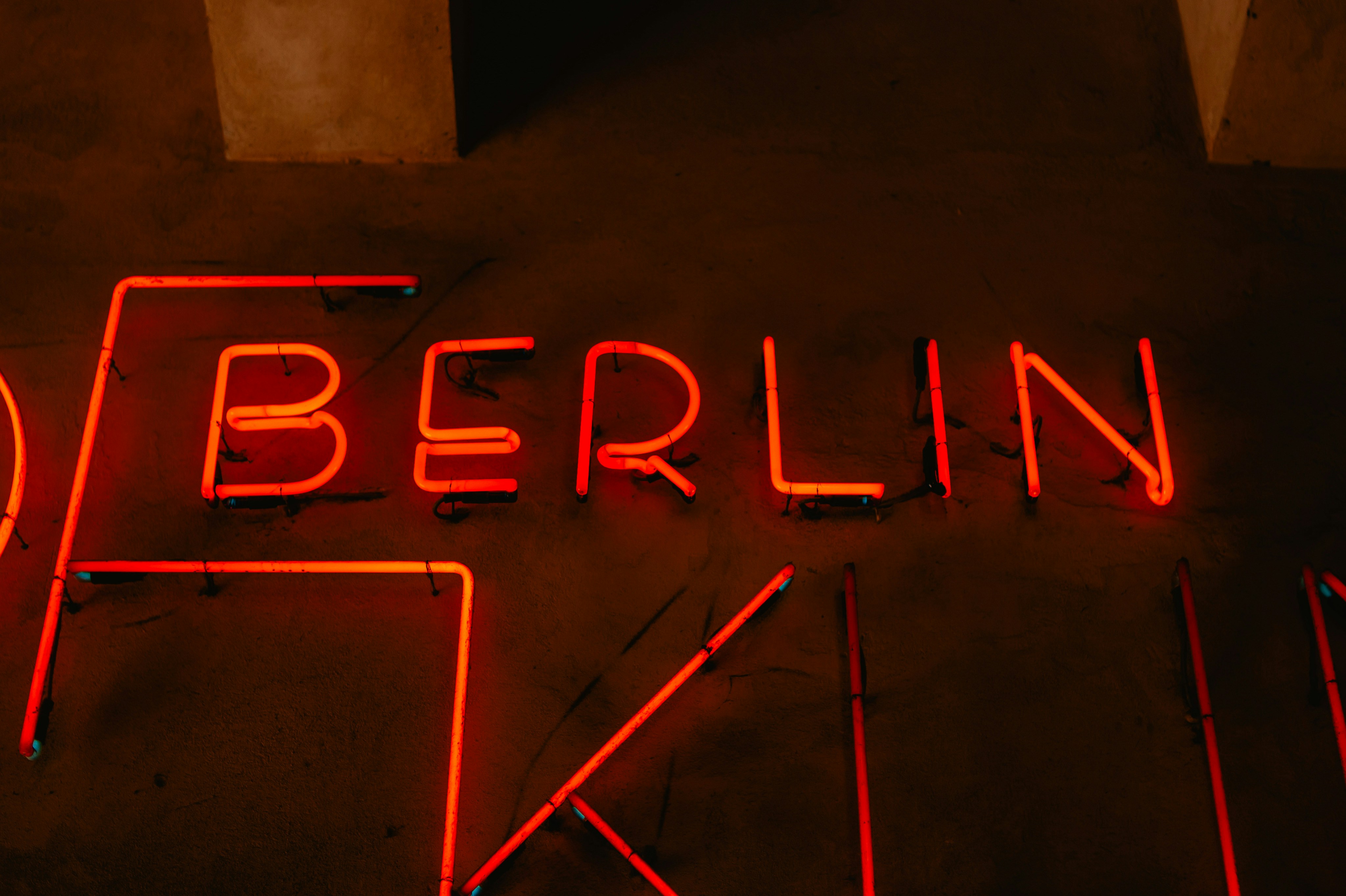Neon Berlin: Glowing Letters Recalling Nighttime Echoes