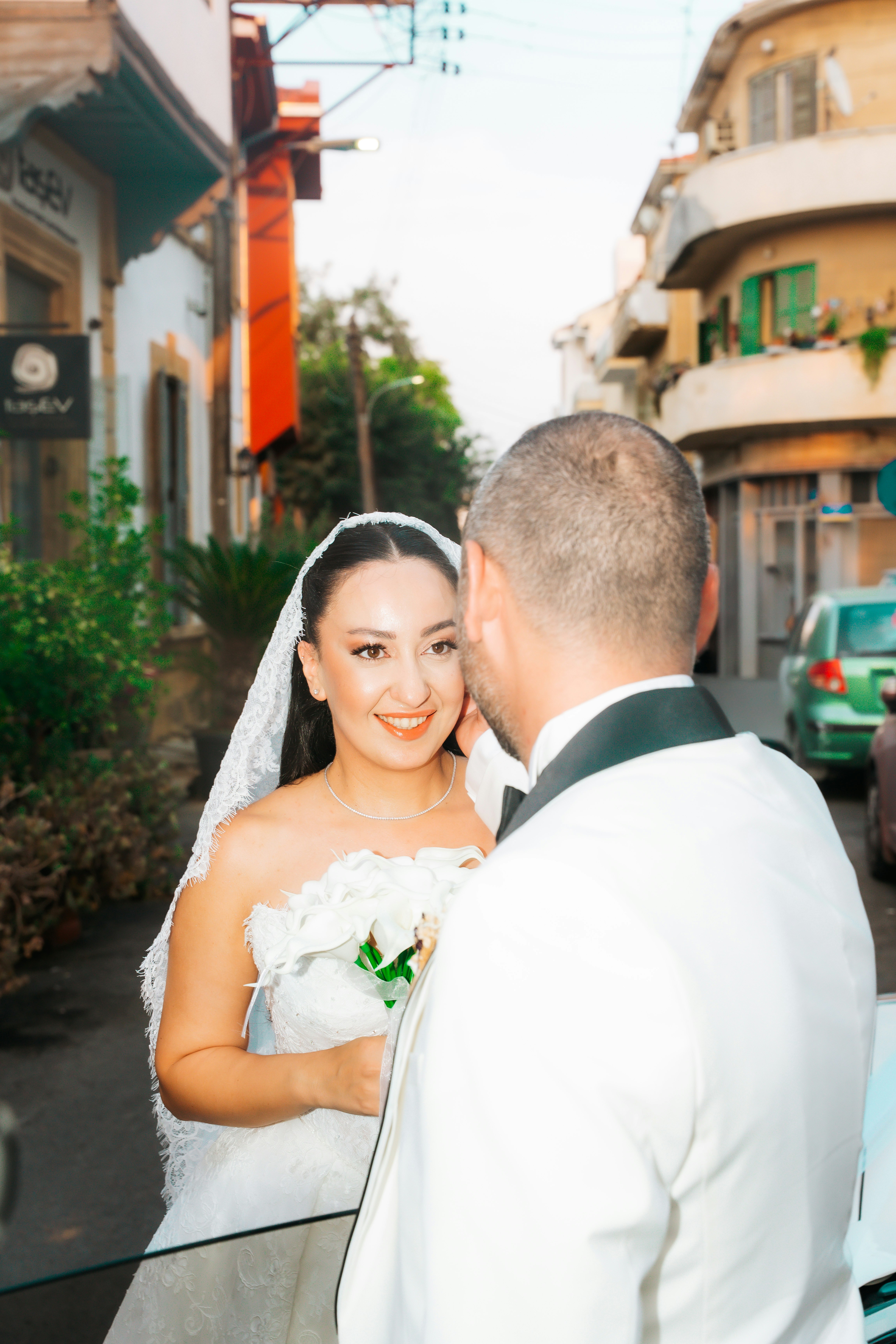 Veil and Vows on a Sunlit Street