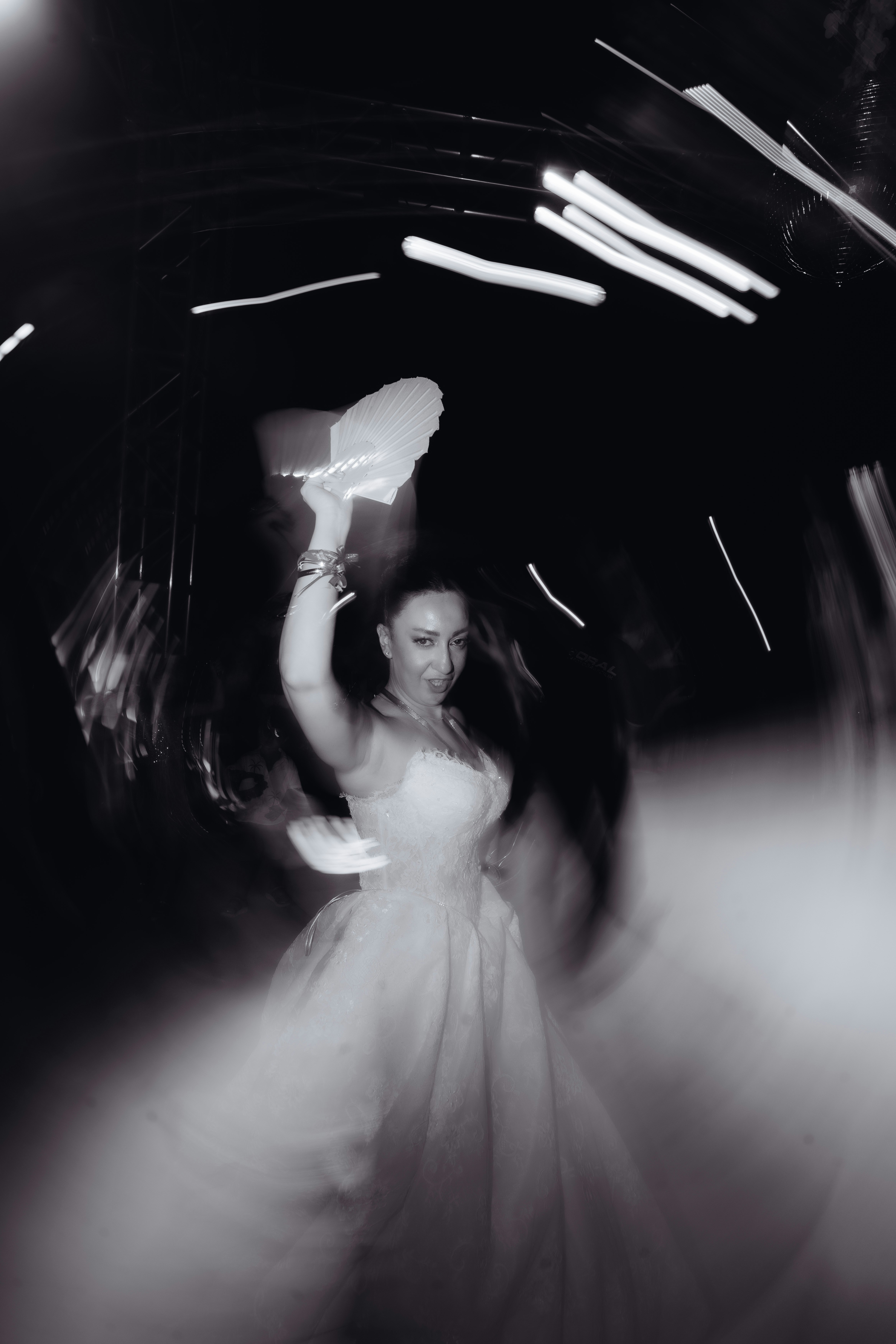 Midnight Bride in Motion: A Whirl of Light and Lace