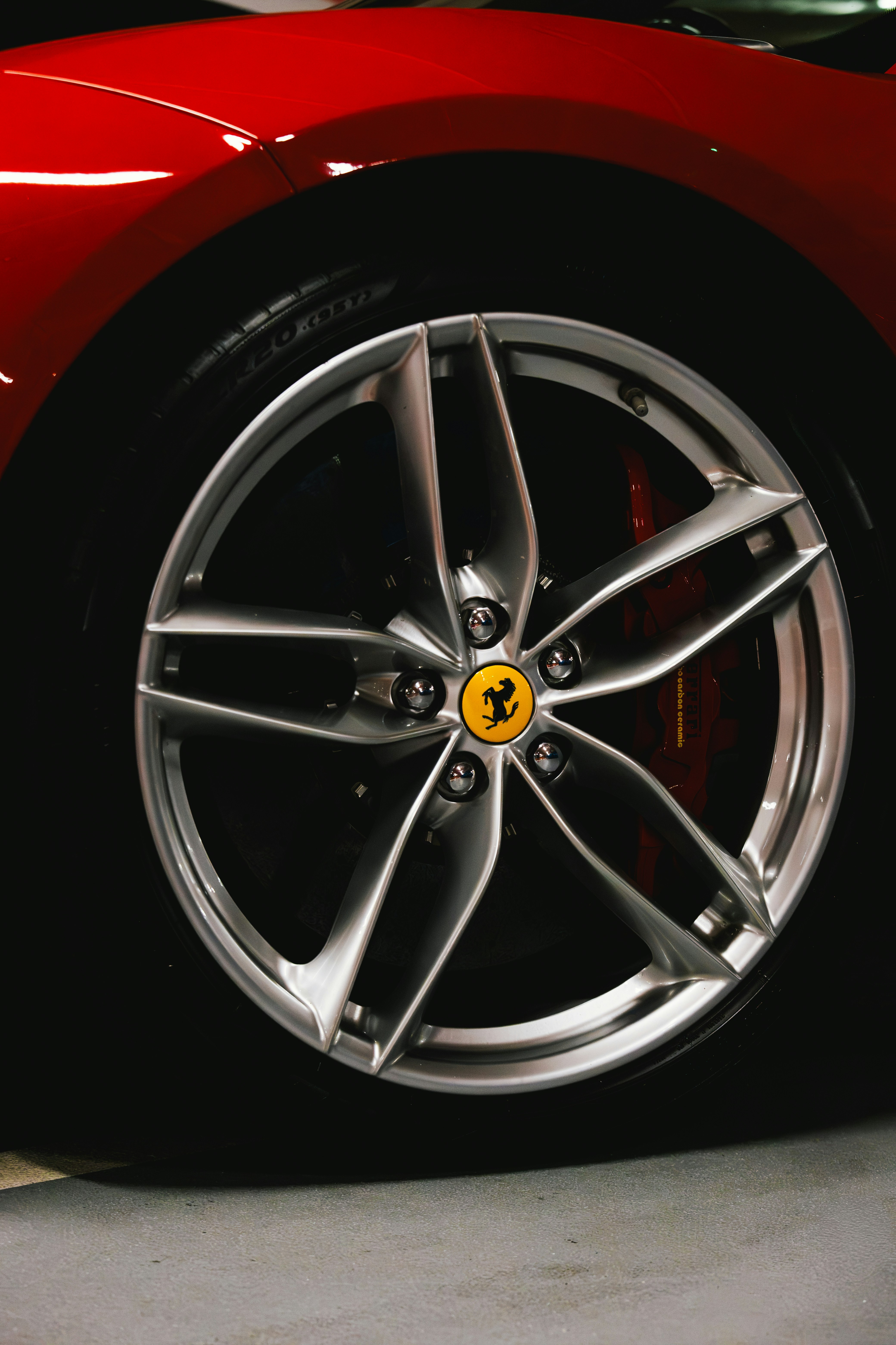 Ferrari Wheel: Yellow Cavity of Power in Red Silence