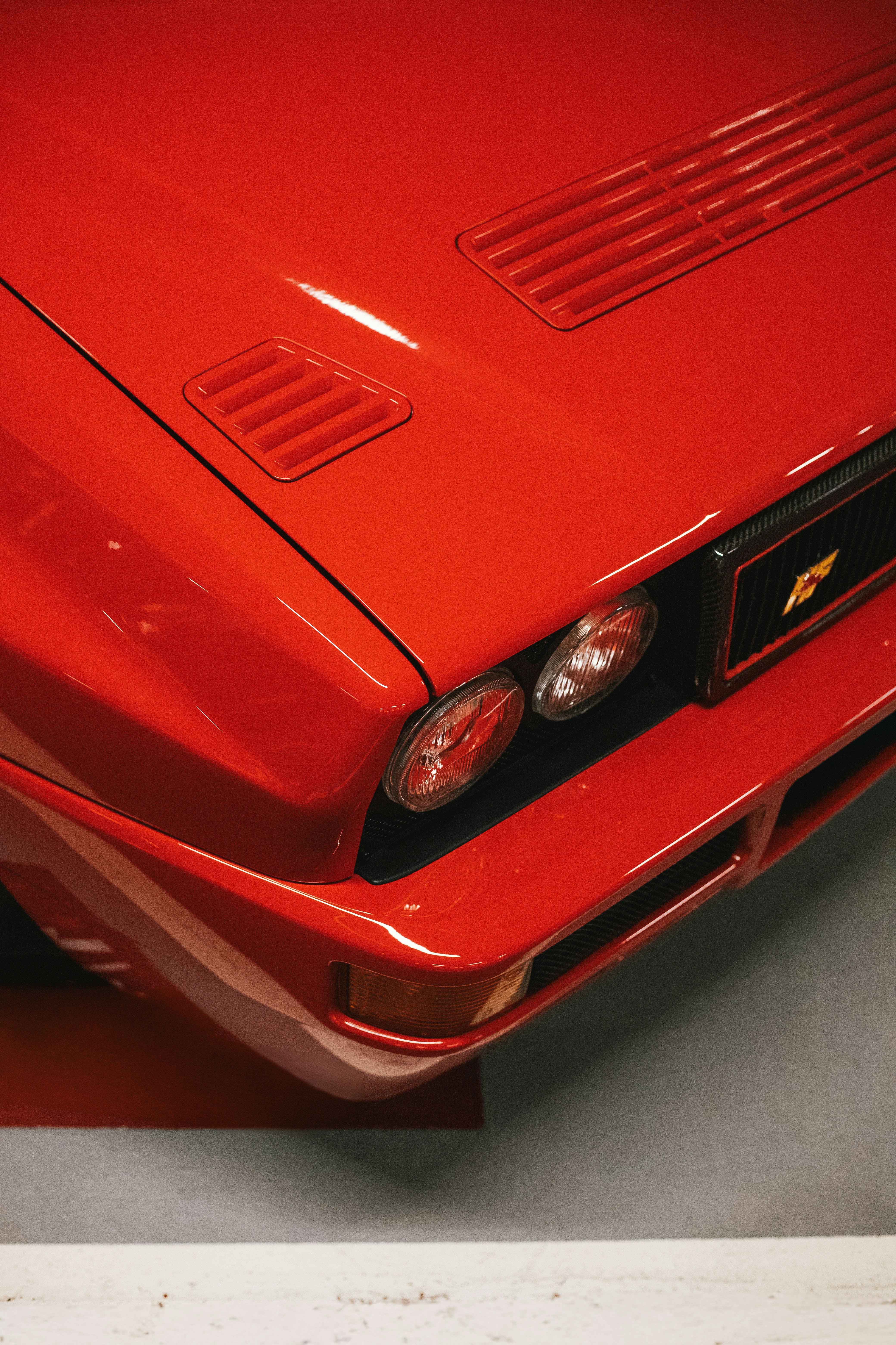 Fiery Red Classic: Front Corner of a Porsche/Similar Sports Car