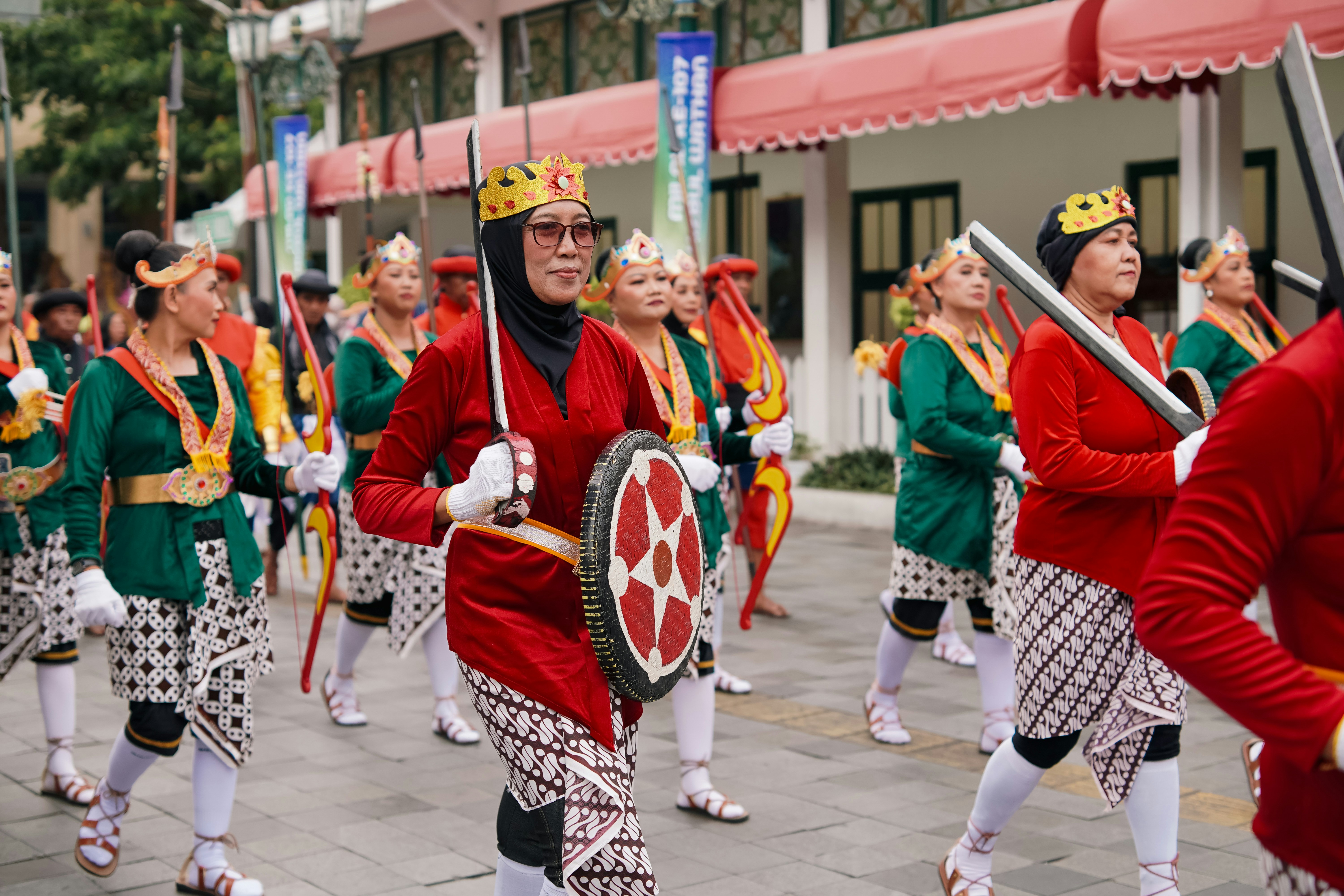 Drums of Color: A Parade of Royal Adornments marching down the street