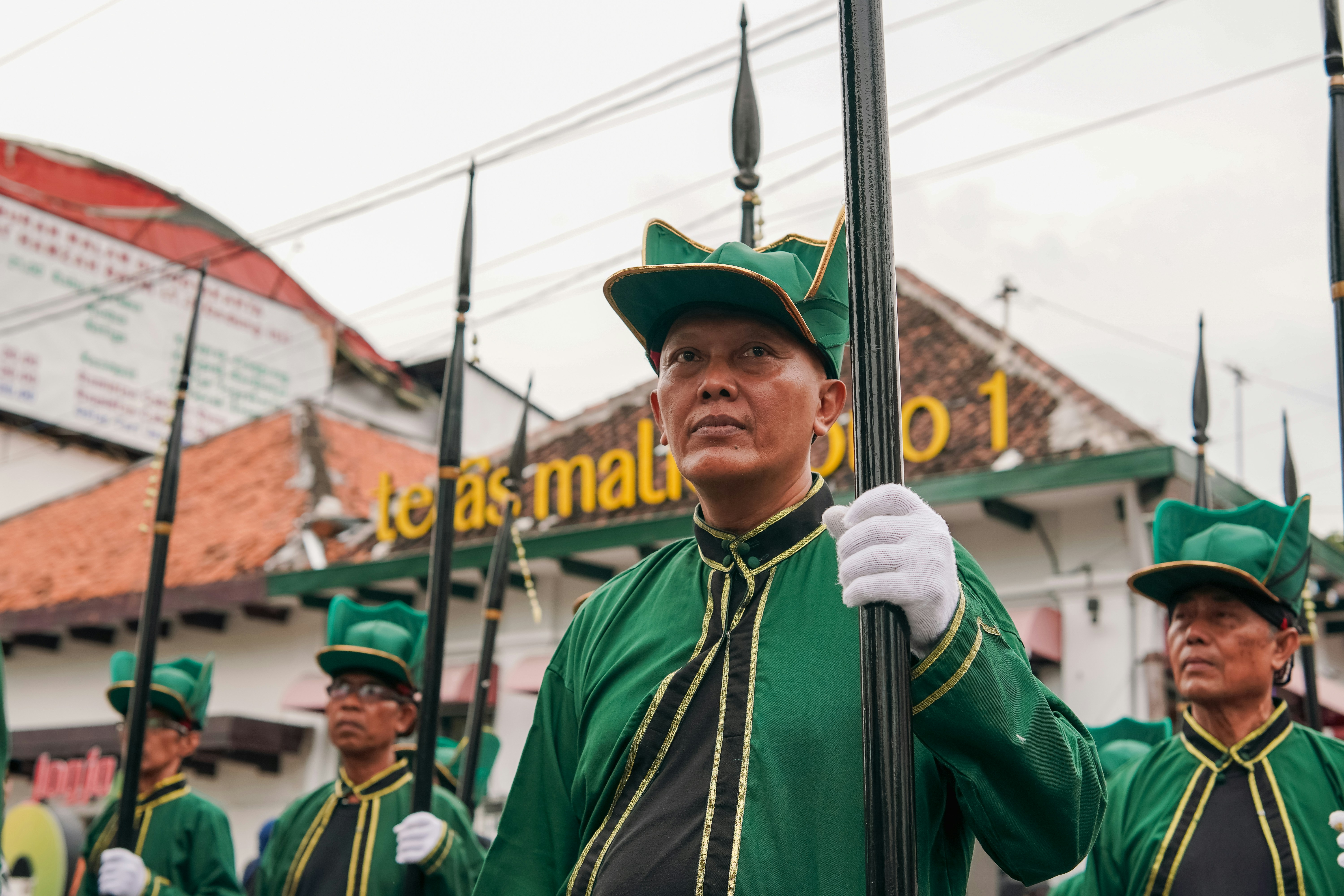 Green Uniforms and Spears: A Parade of Ceremony in the Barrio