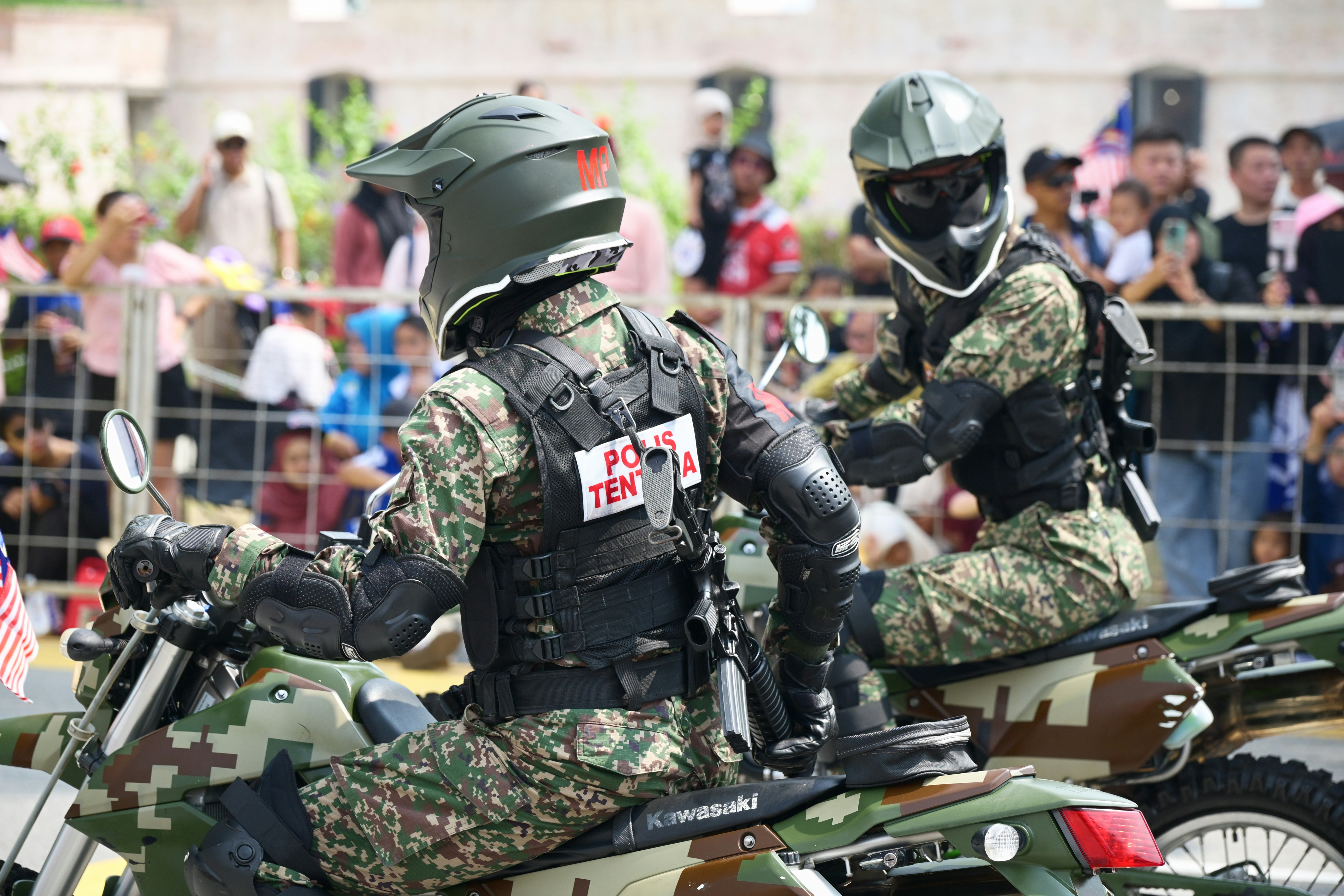 Patrol Echo: Armored Riders Pause as onlookers watch