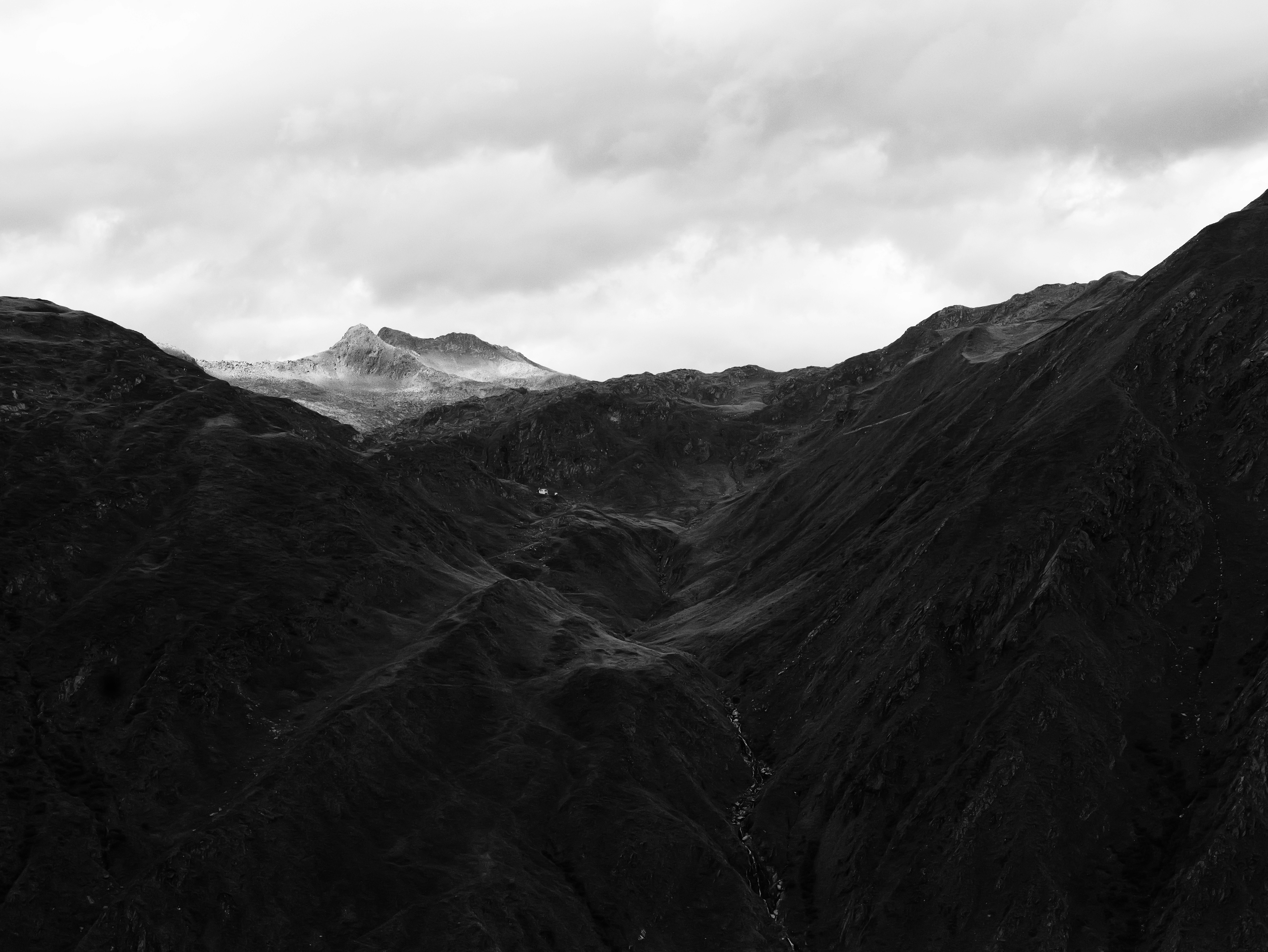 Mist-Laced Ridge: A Silent Ascent into Dark Skyes