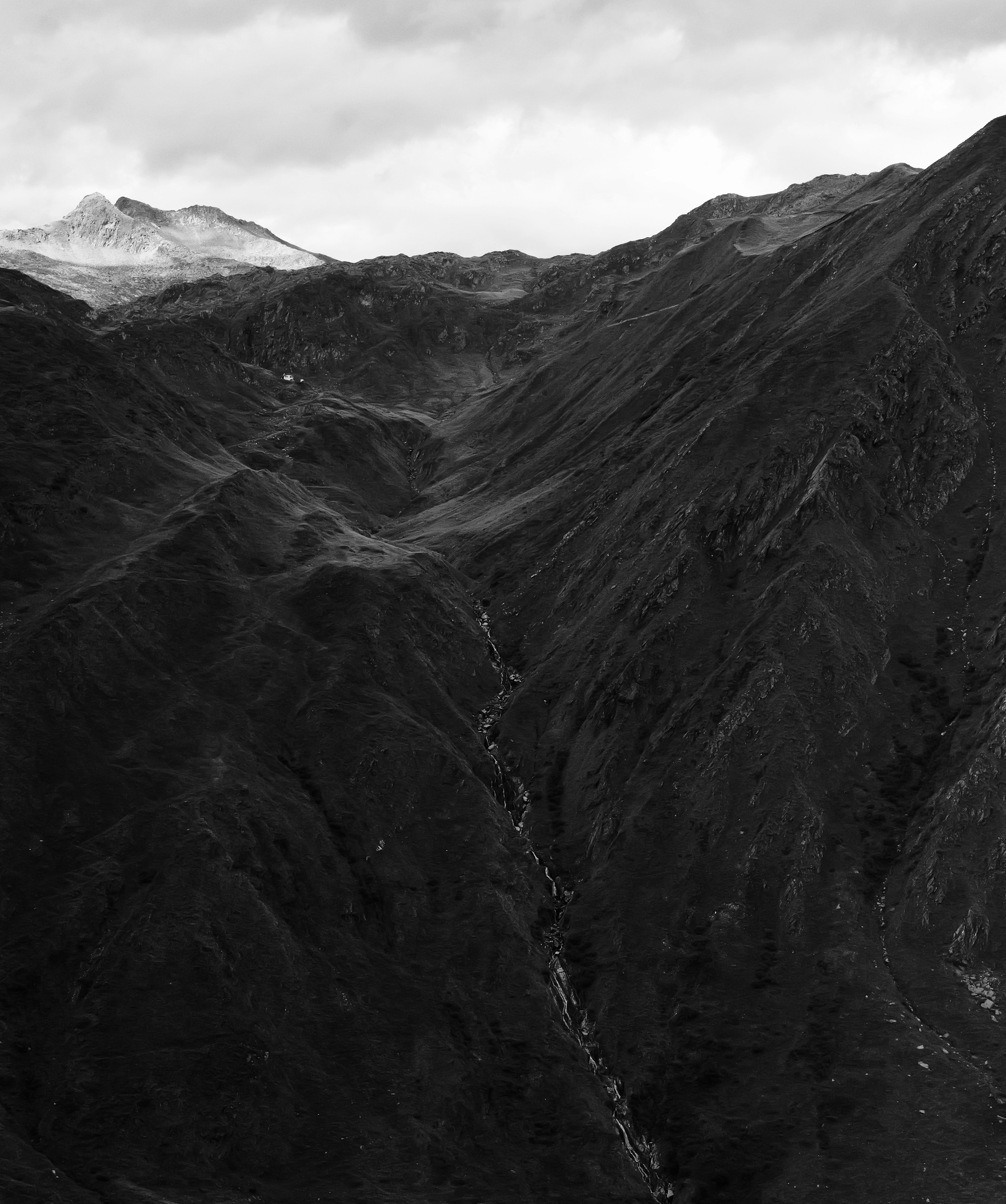 Ridge and Rift: A Monochrome Ascent Through Stark Mountain Valleys