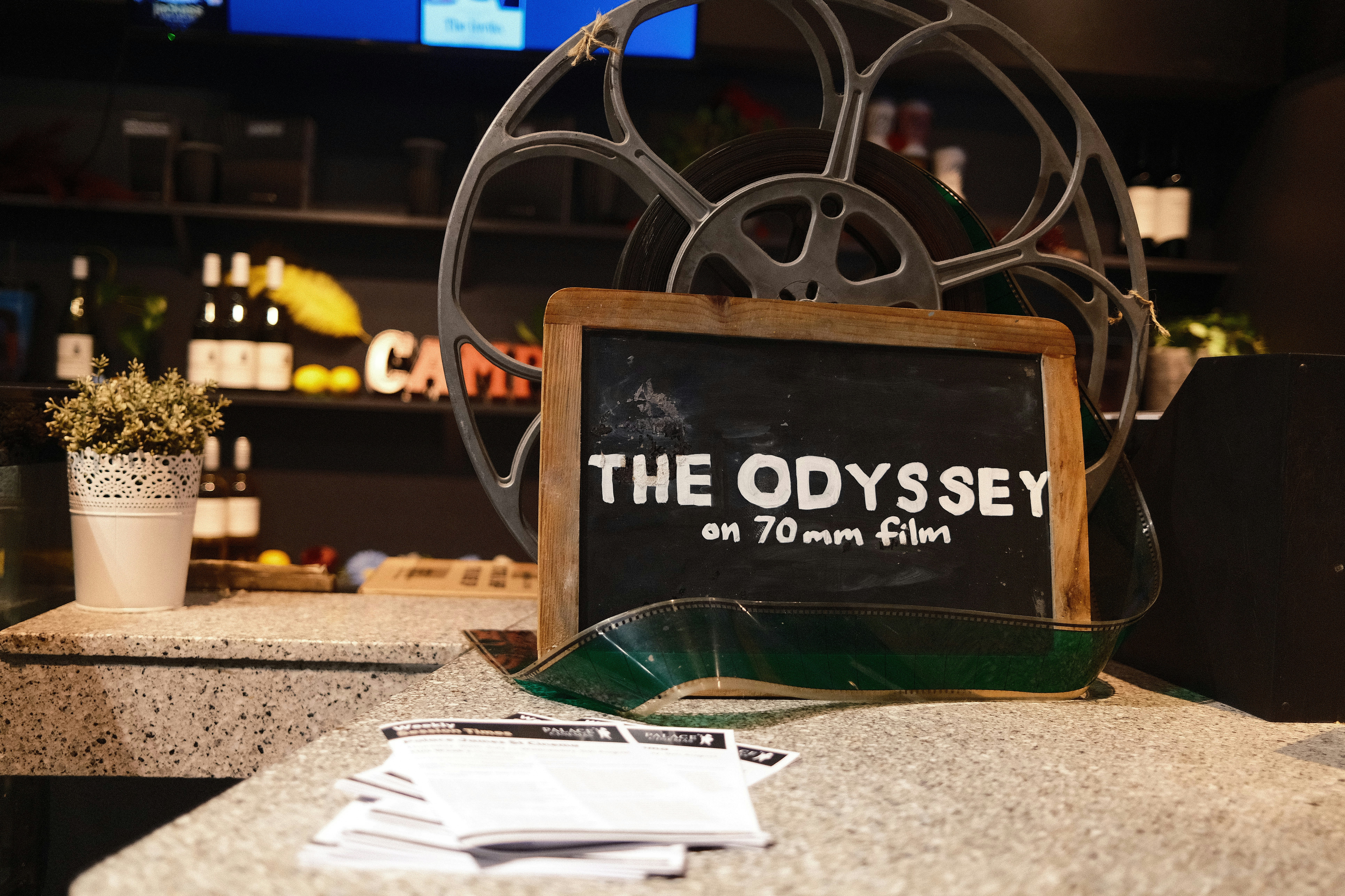 Reel of Stories: The Odyssey Chalkboard in a Vintage Film Shop