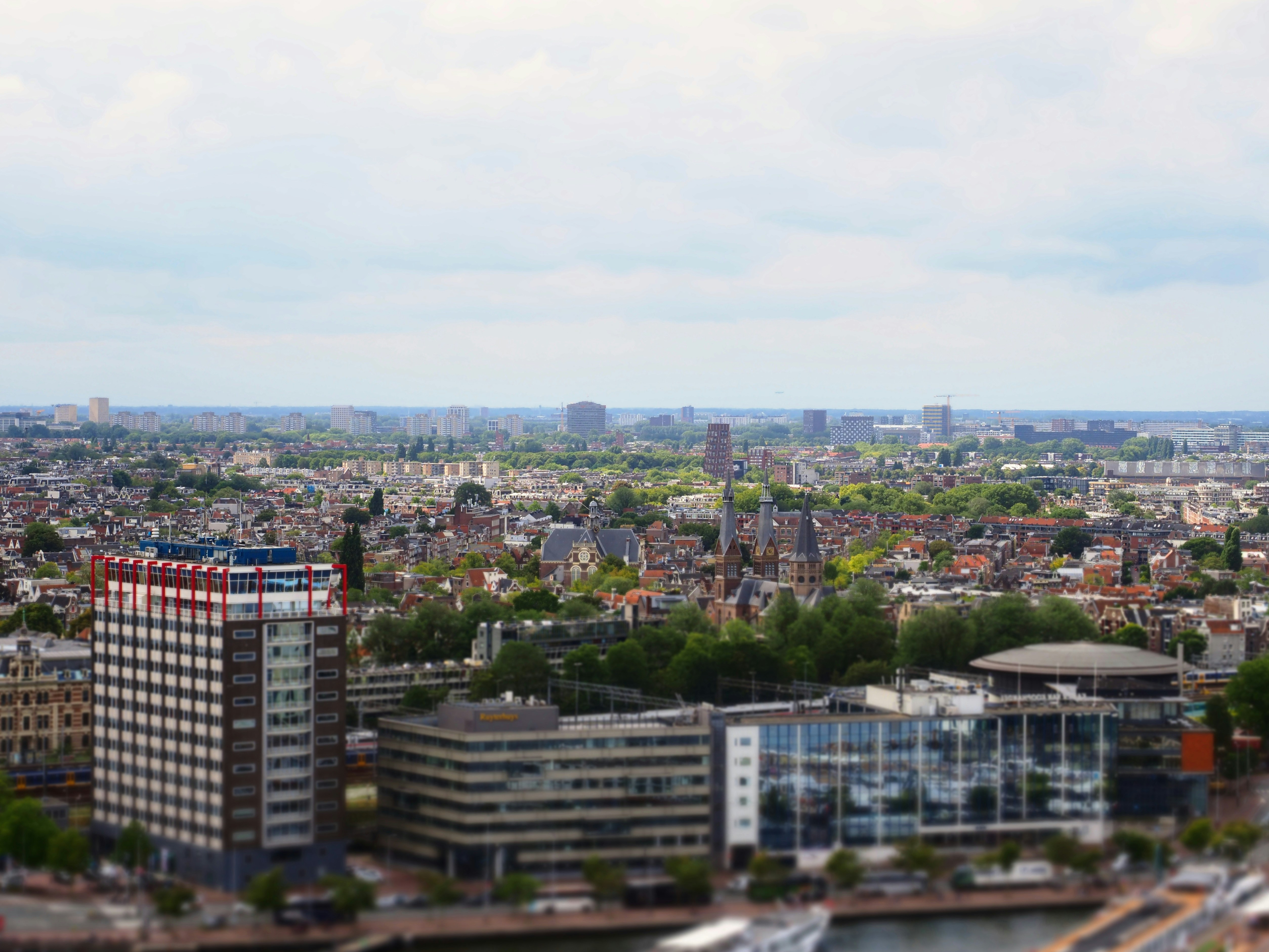 Urban Ribbon: A Tilted Panorama of a Distant City Block