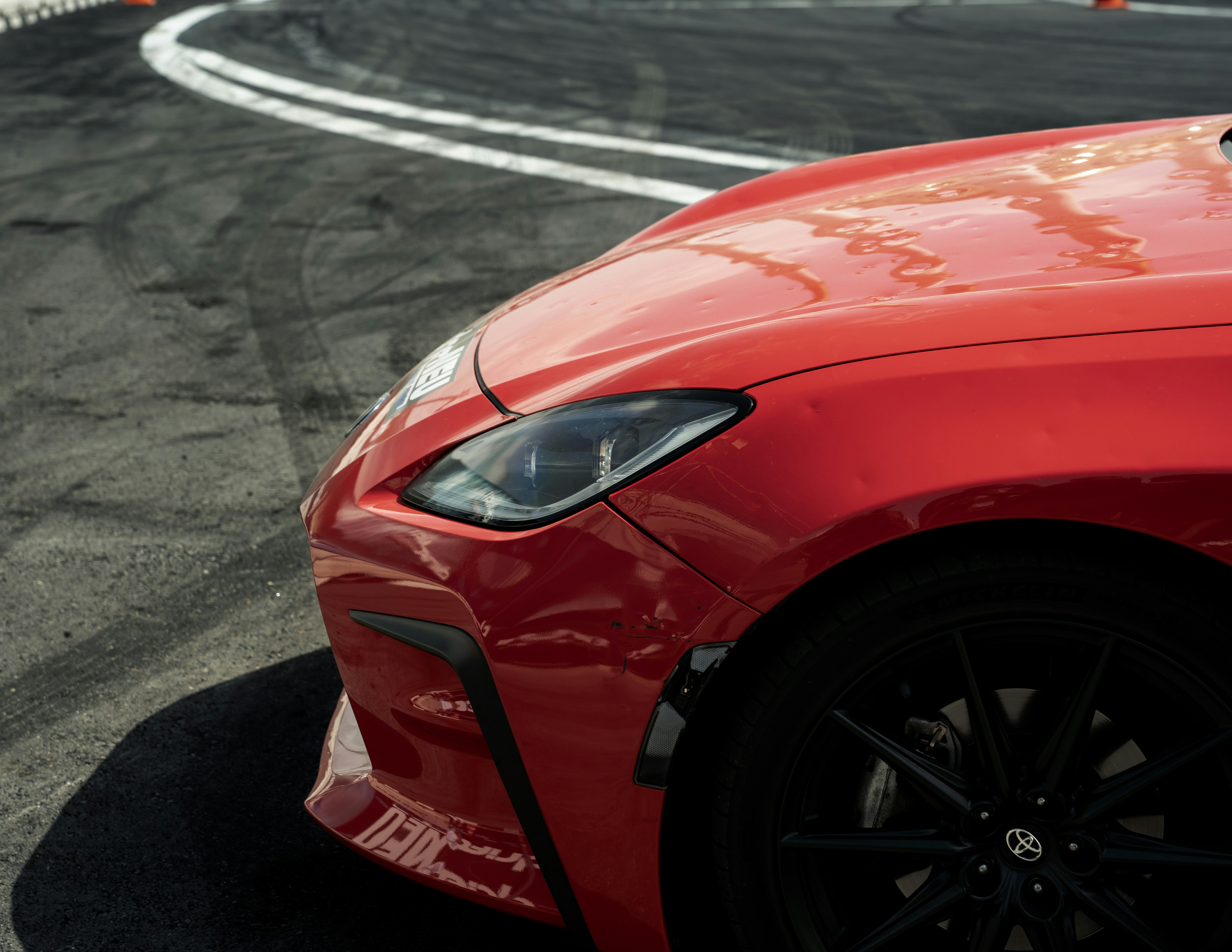 Crimson Curve: The Car’s Front Streak of Precision