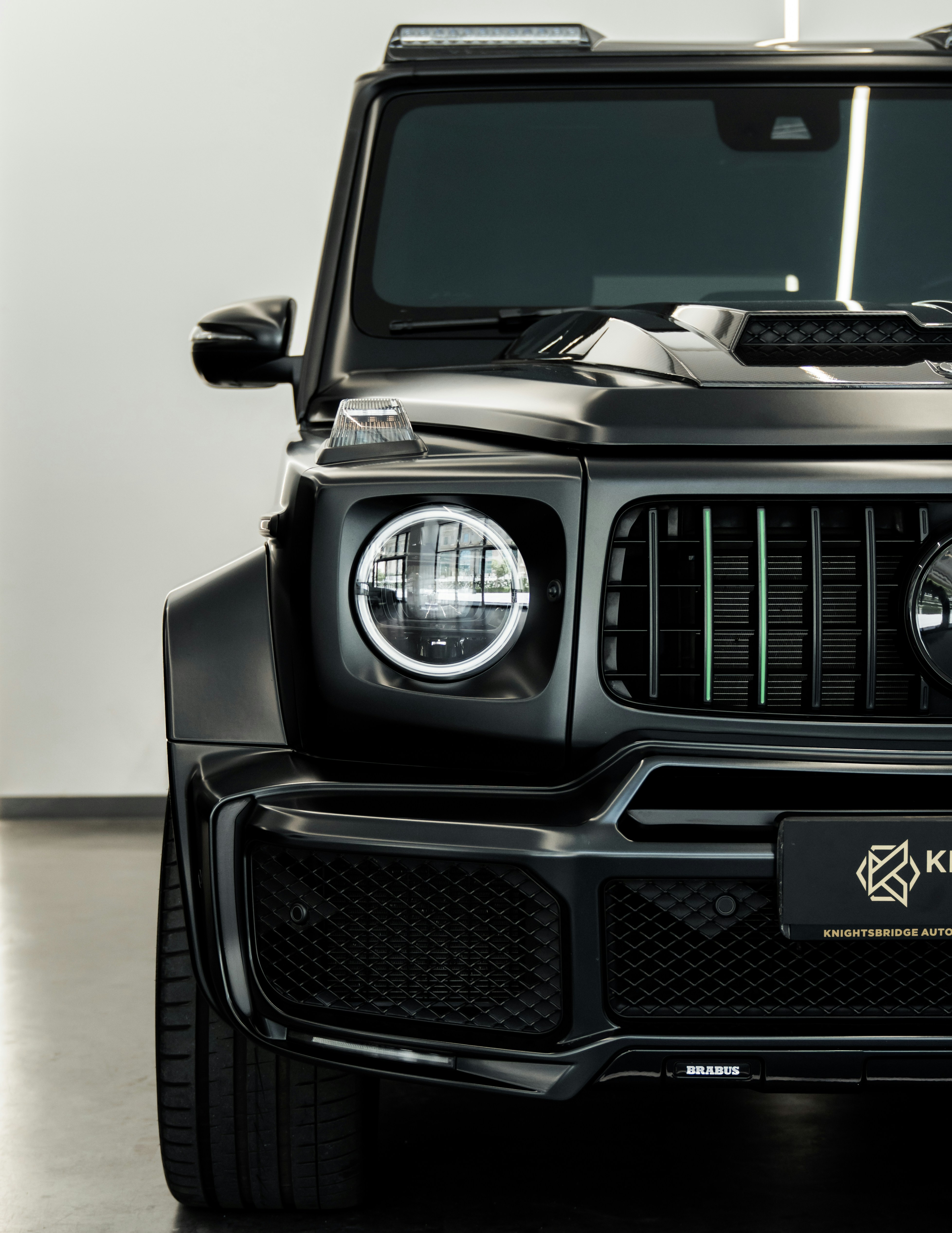 Front-and-center Power: A Close-Up of a Blacked-Out SUV's Stance