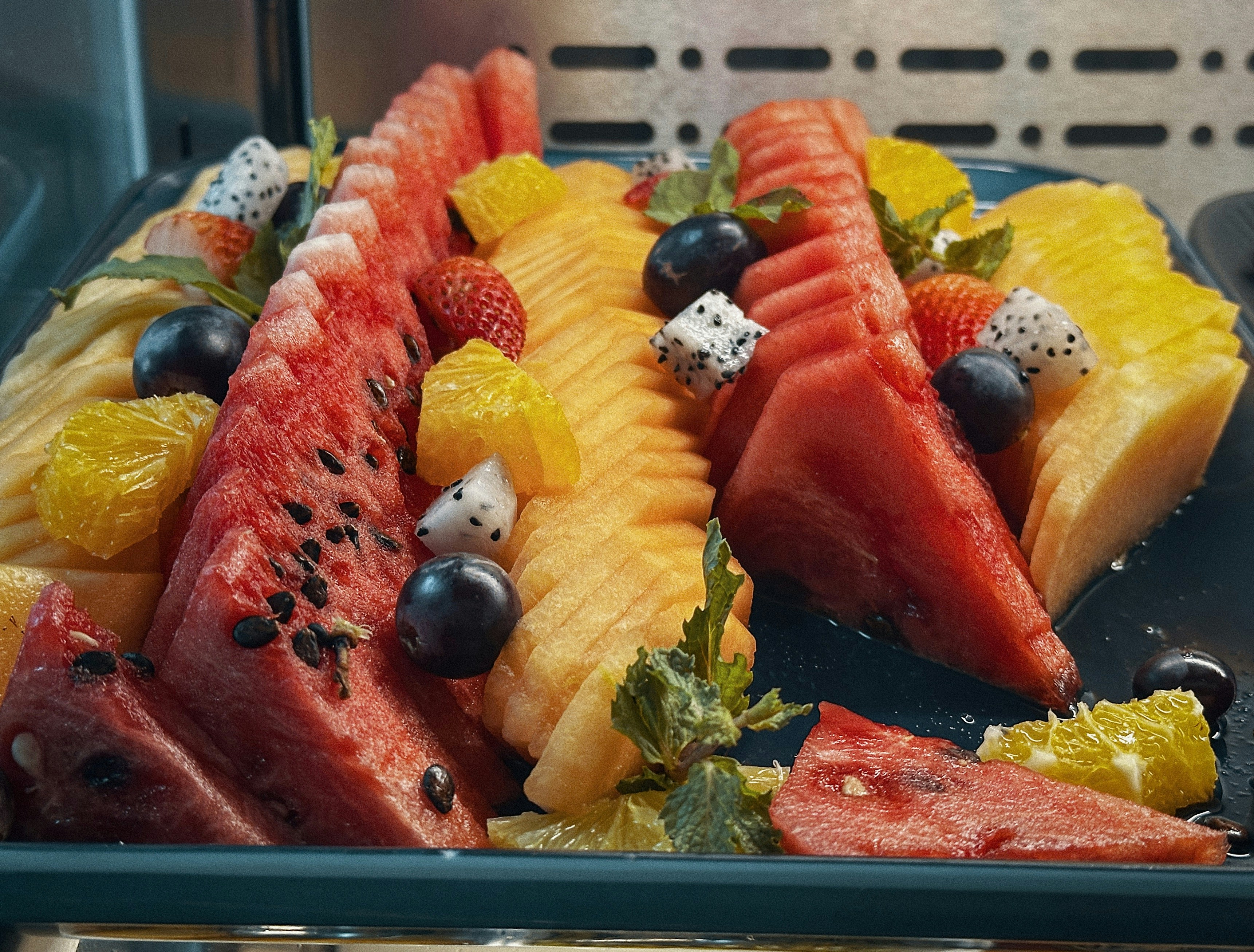 Sun-kissed Rainbow Fruit Mosaic on a Shimmering Tray
