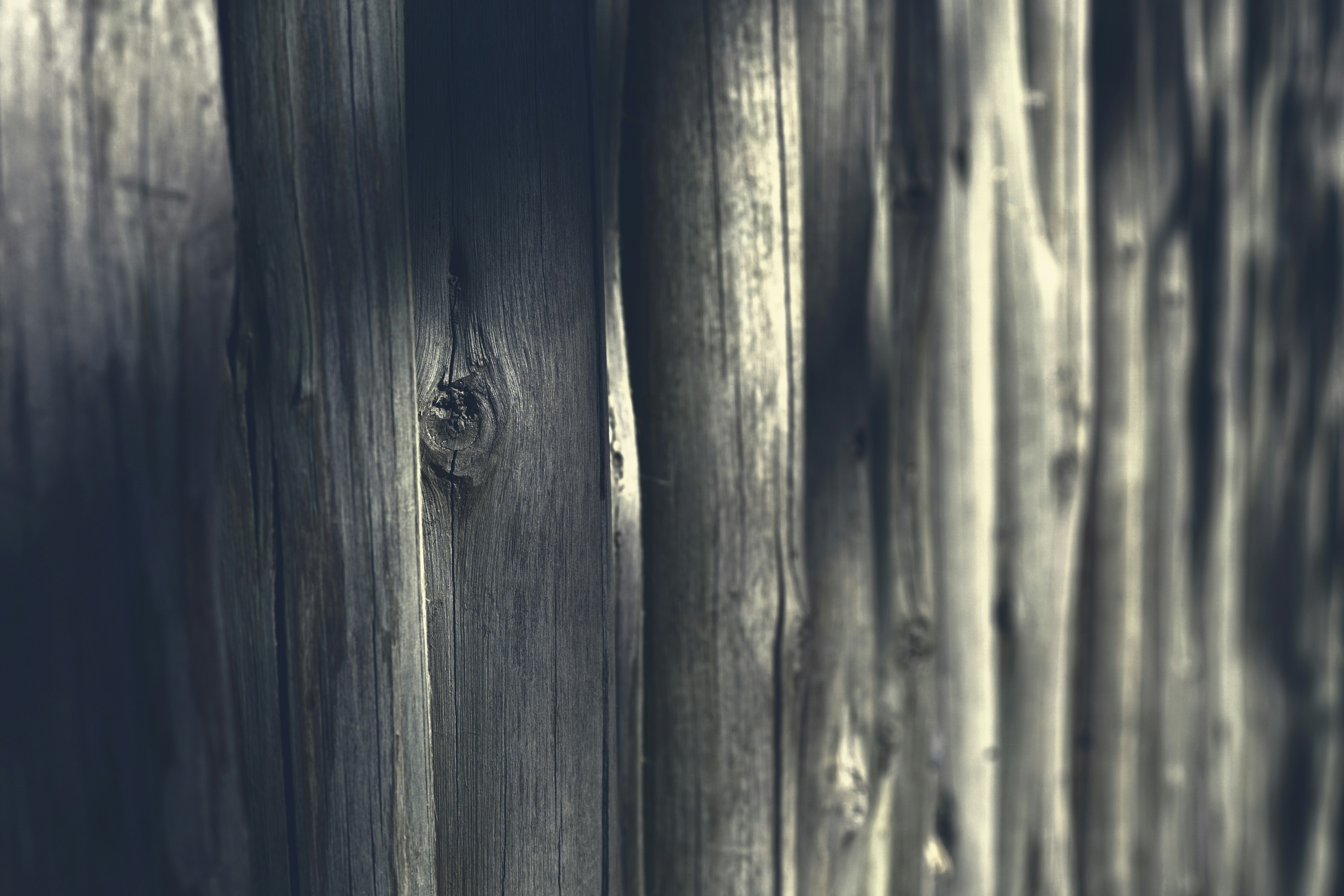 Weathered Timber: A Quiet Cadence of Stacked Planks