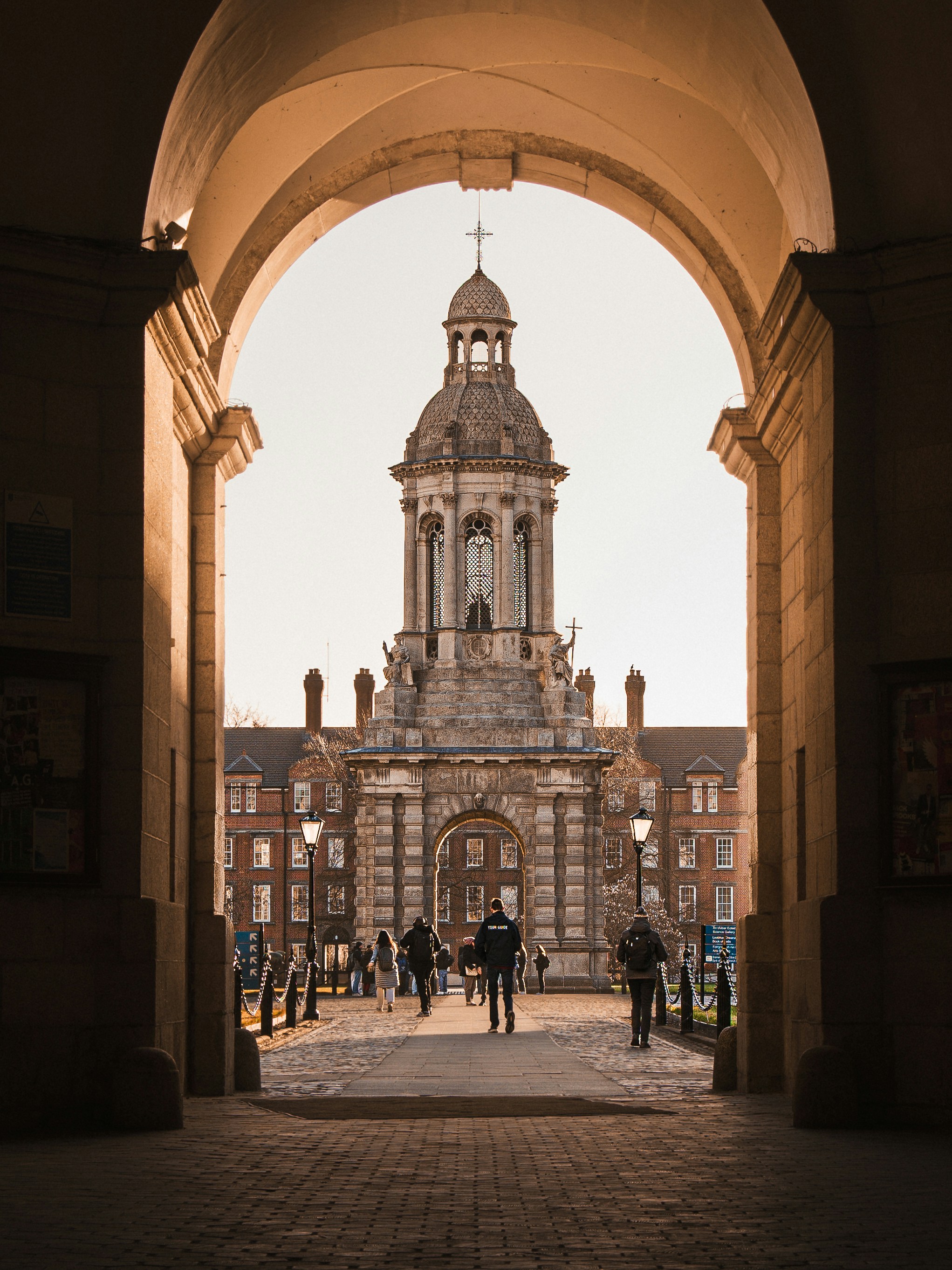 Framed Arc: A Clocktower Chapel Through the Arch