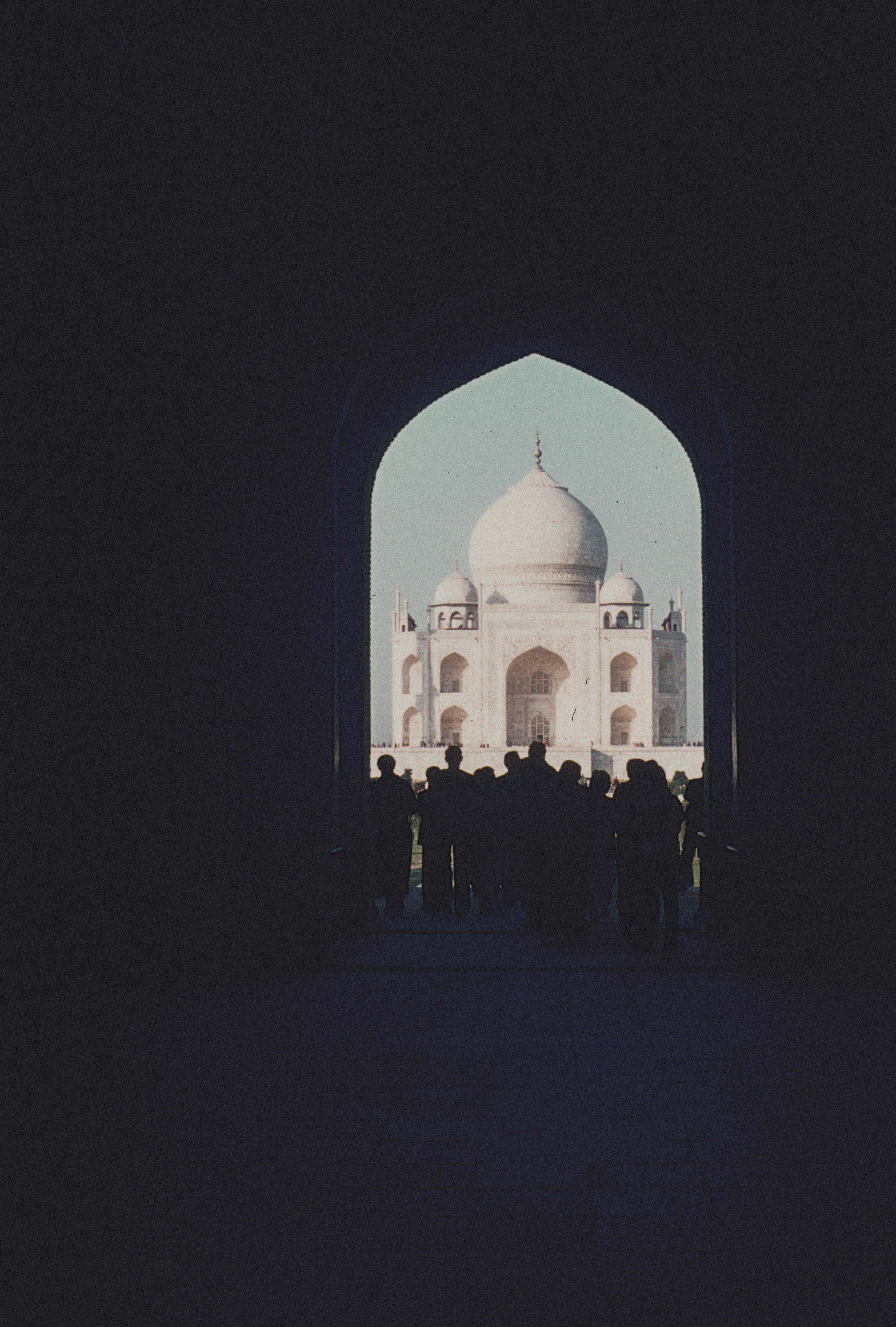 Silhouette Gate: View Through the Archway to the Taj-like Monument