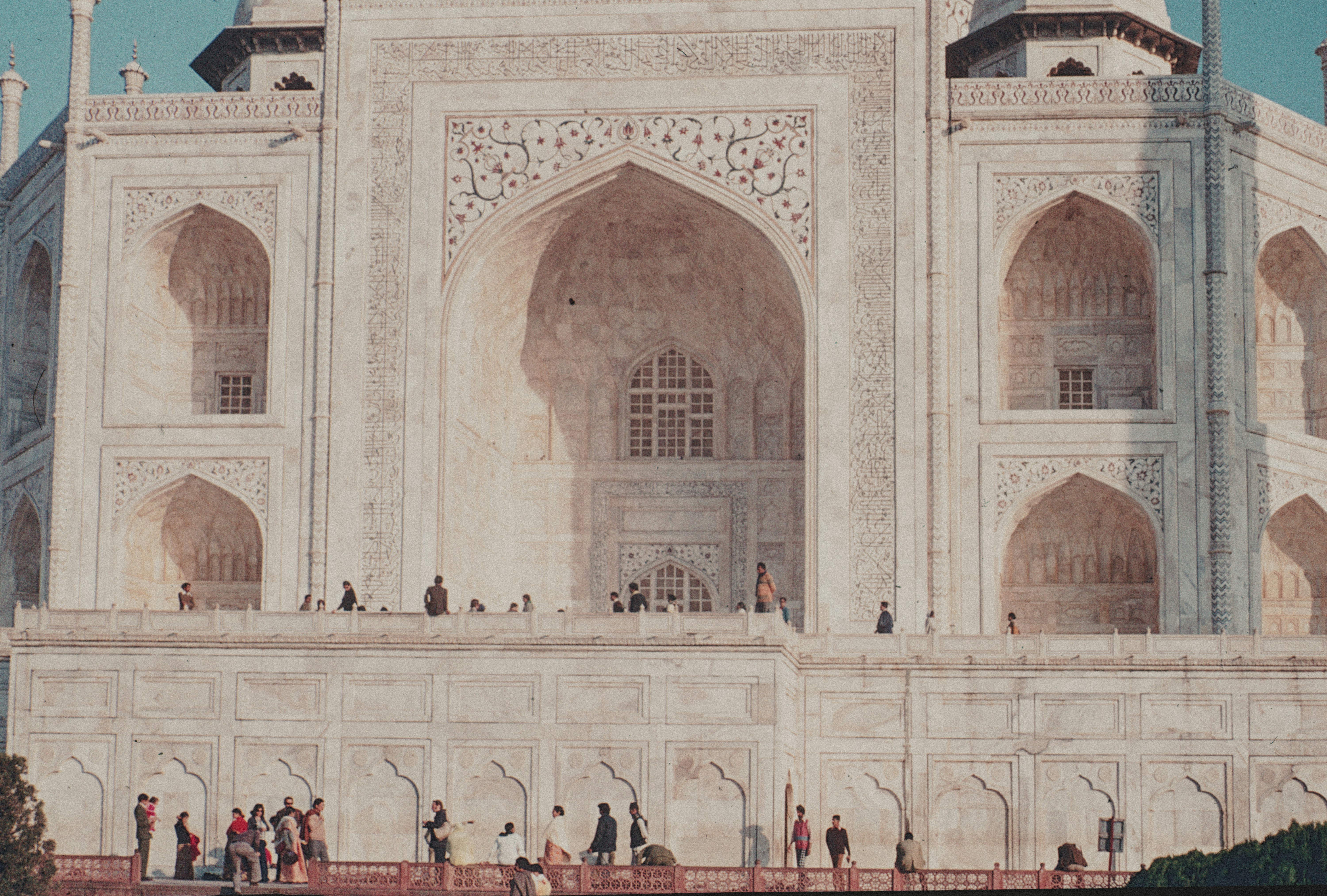 Facade of the Taj Mahal: Symmetry and Silent Crowds