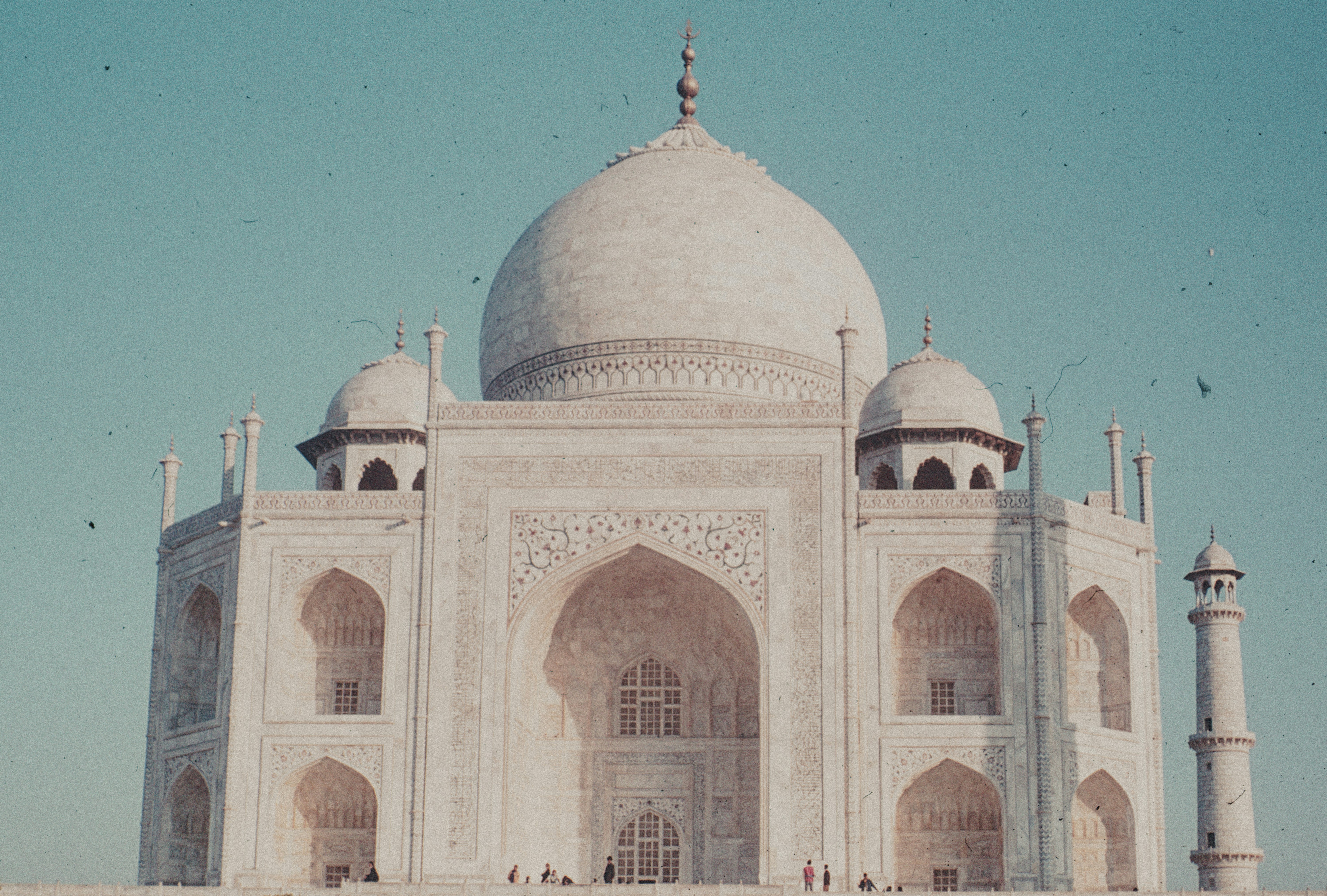 Monumental symmetry: the Taj Mahal rises against a pale blue sky
