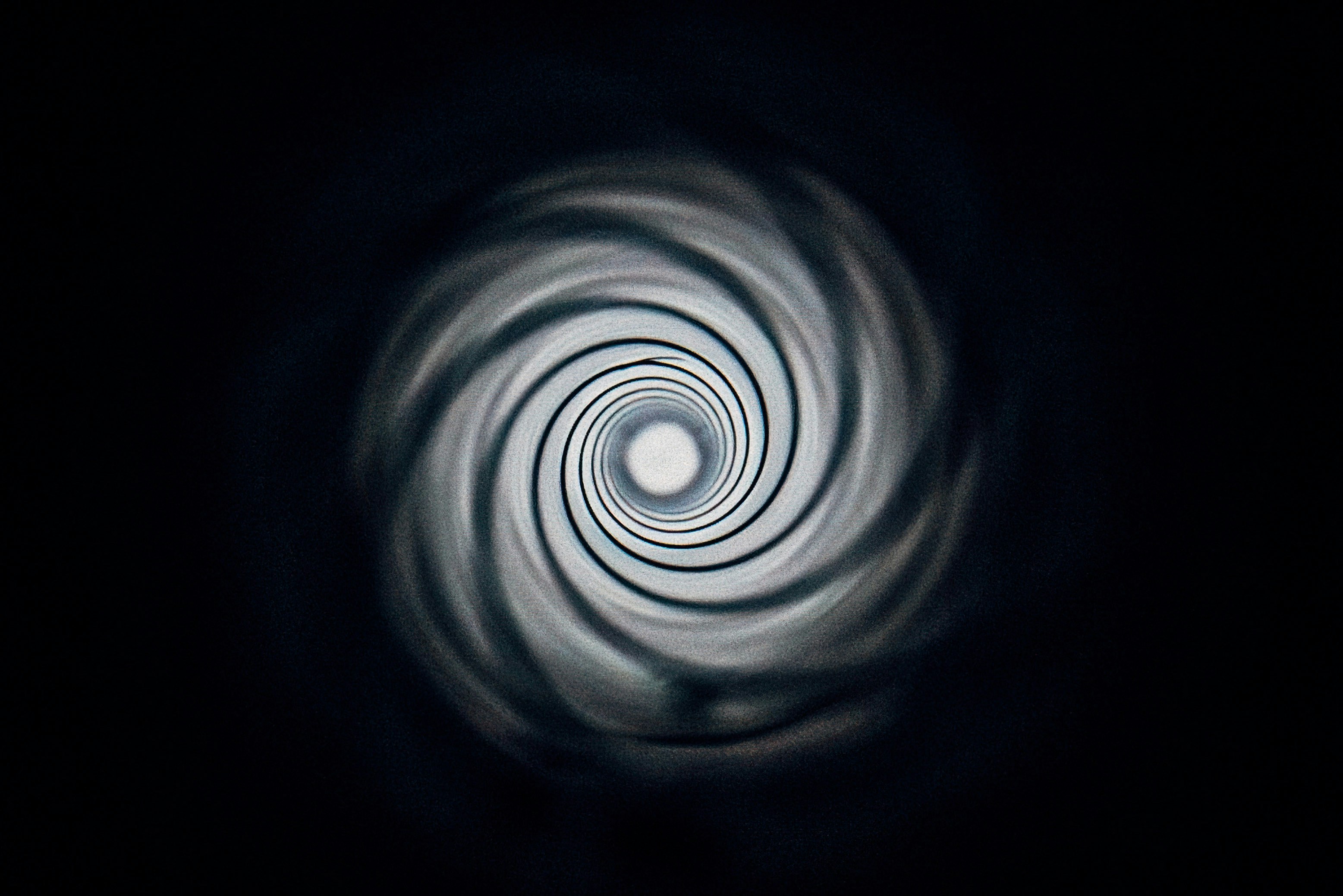 Spiral Light: A Vortex of Light and Darkness