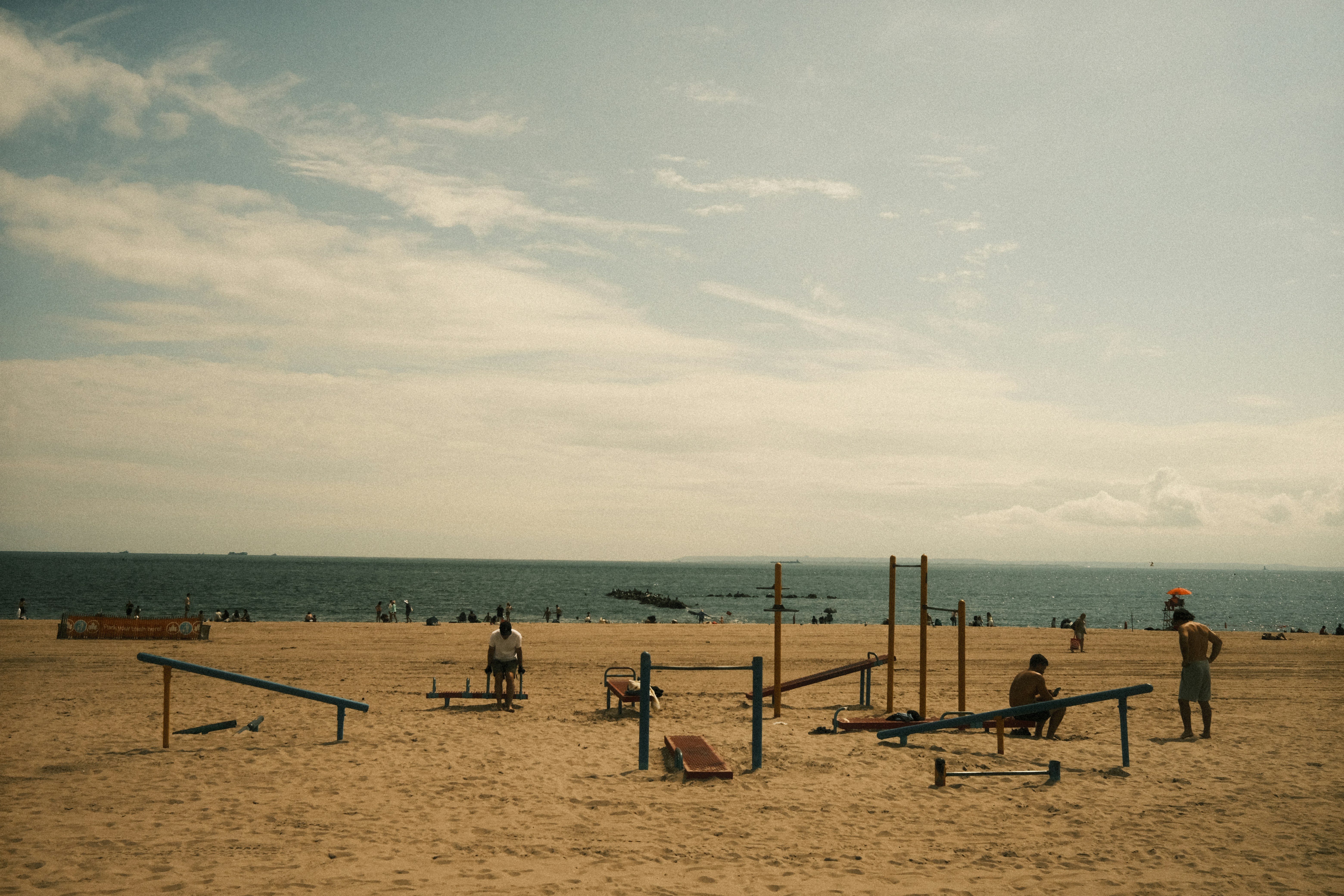 Calm Beach Workout: Wooden Balance Bars Reach for the Horizon