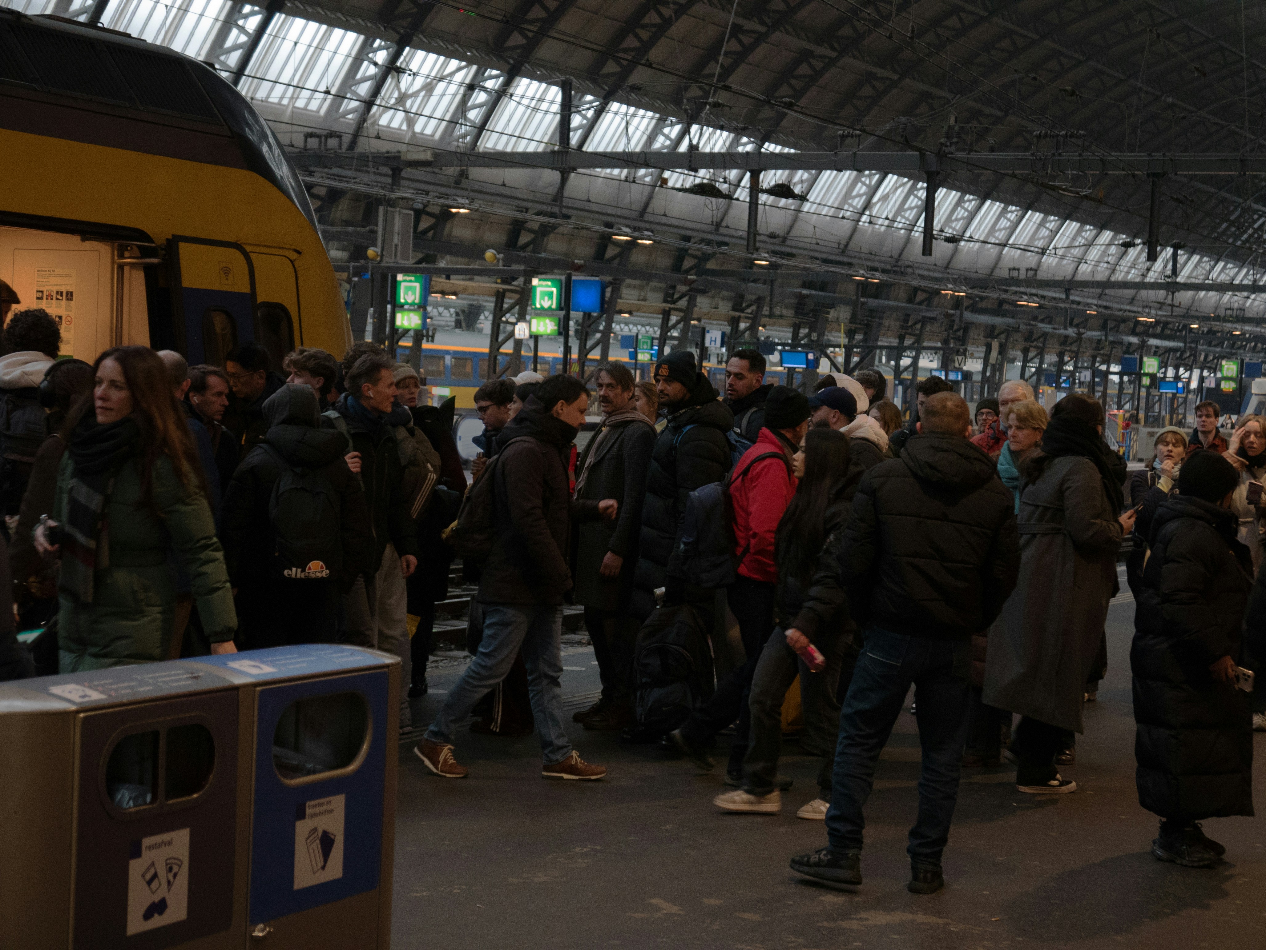 Crowded Platform Pulse: Commuters Converge at a Busy Station