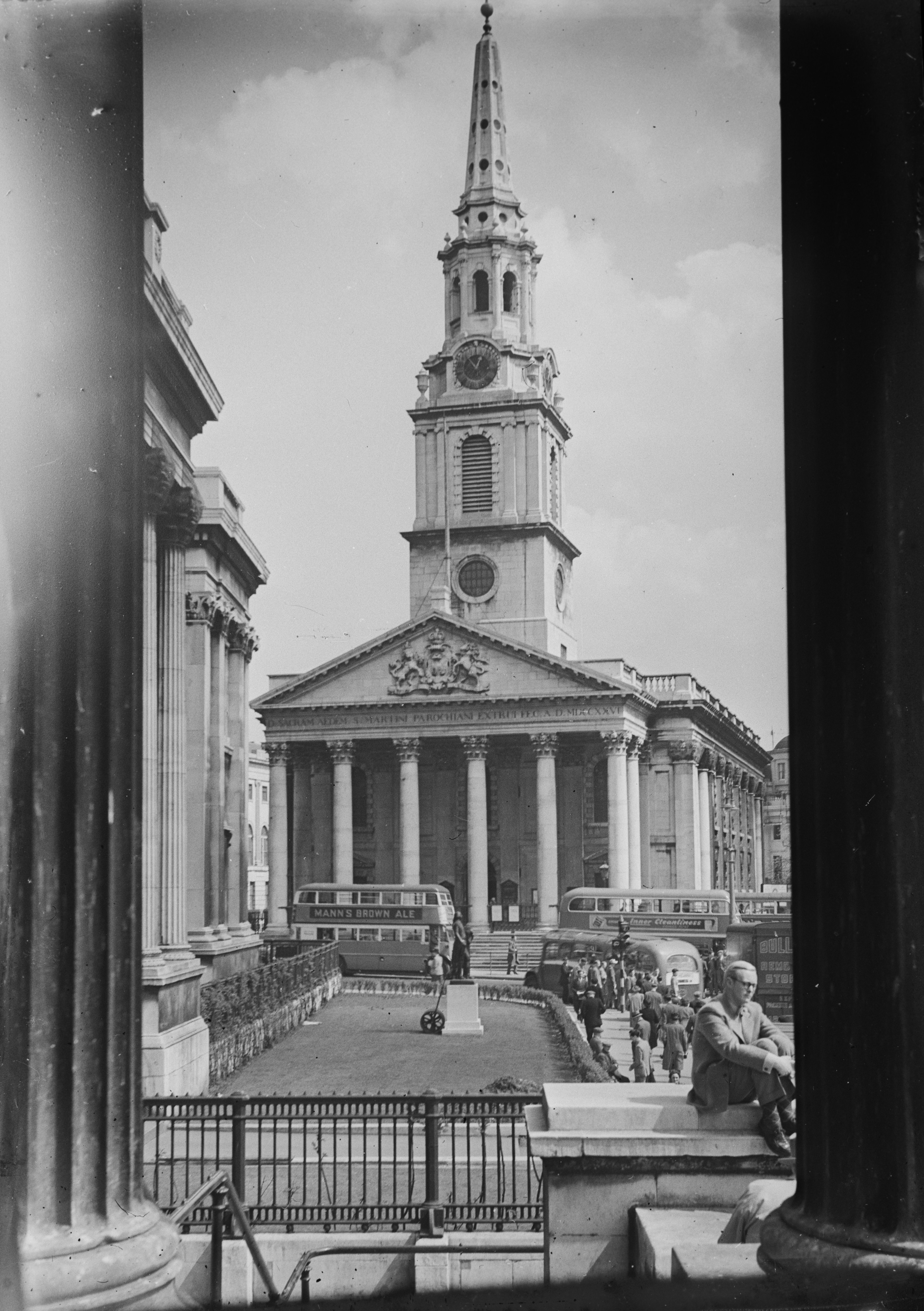 Stately Pediment and Clock Tower Framed by Classical Colonnade