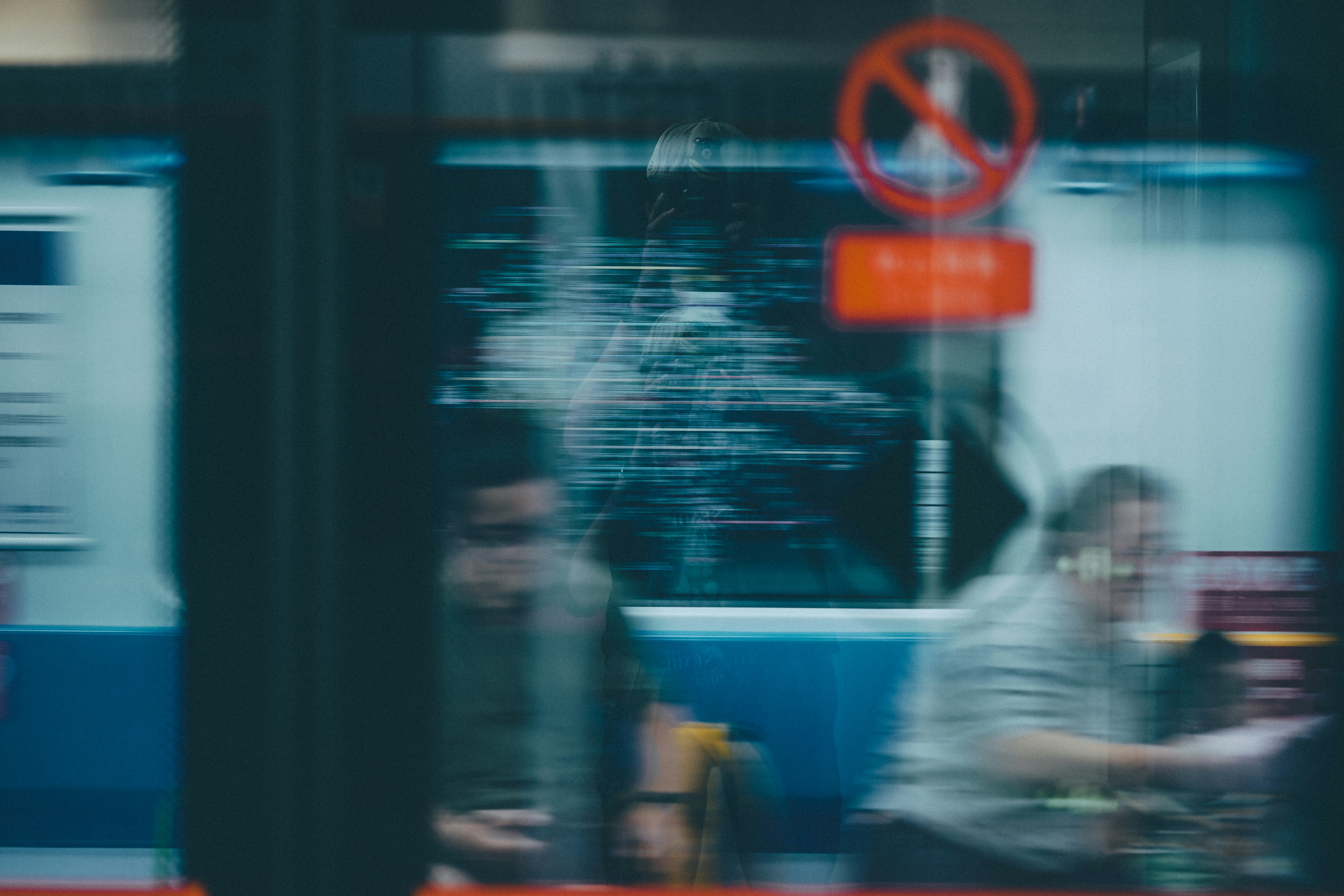 Blurry Subway Momentum: Faces and Movement in Motion