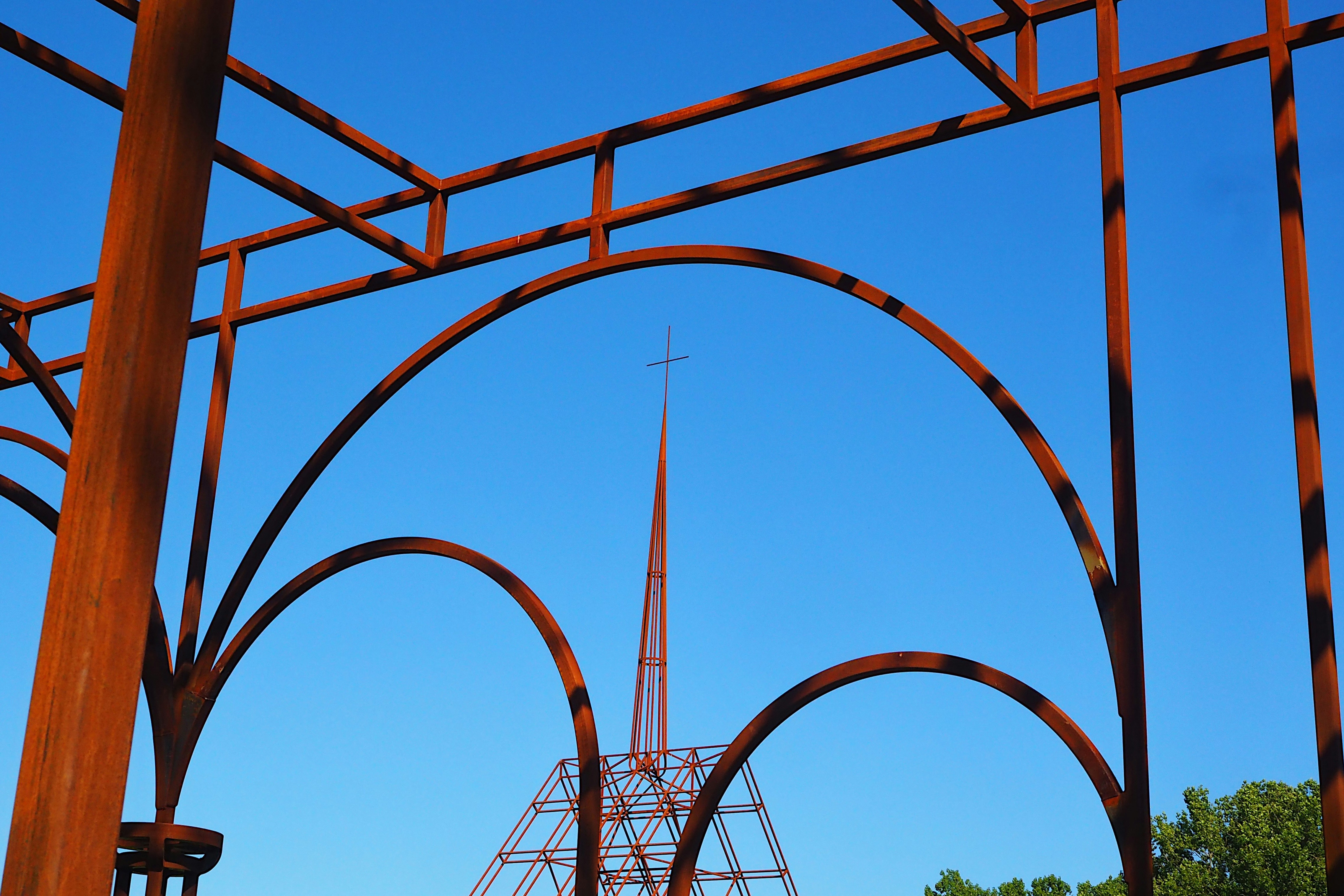 Arched Rust in a Clear Blue Standoff