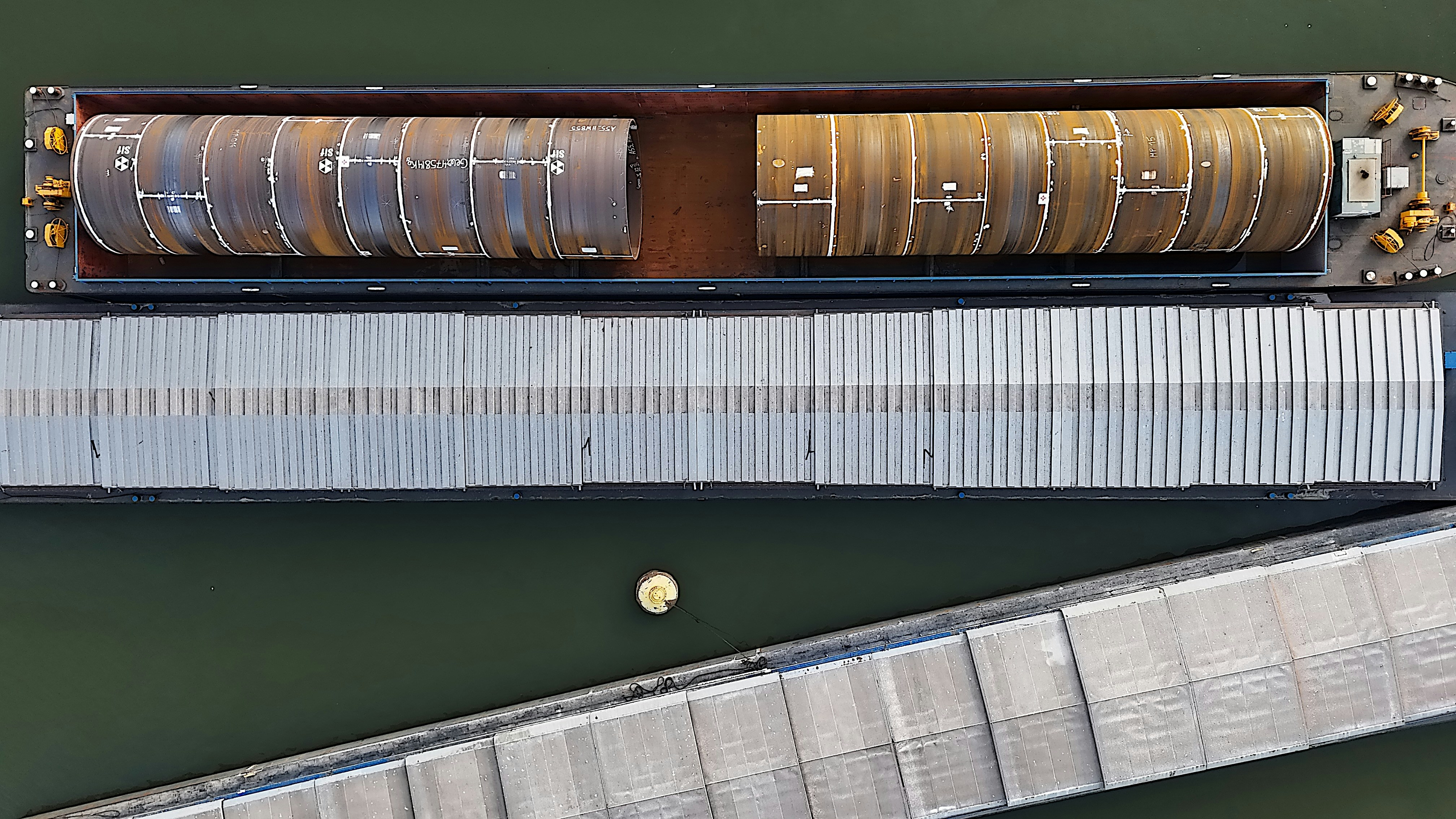 Aerial View of Waterfront Barges and Docked Decks