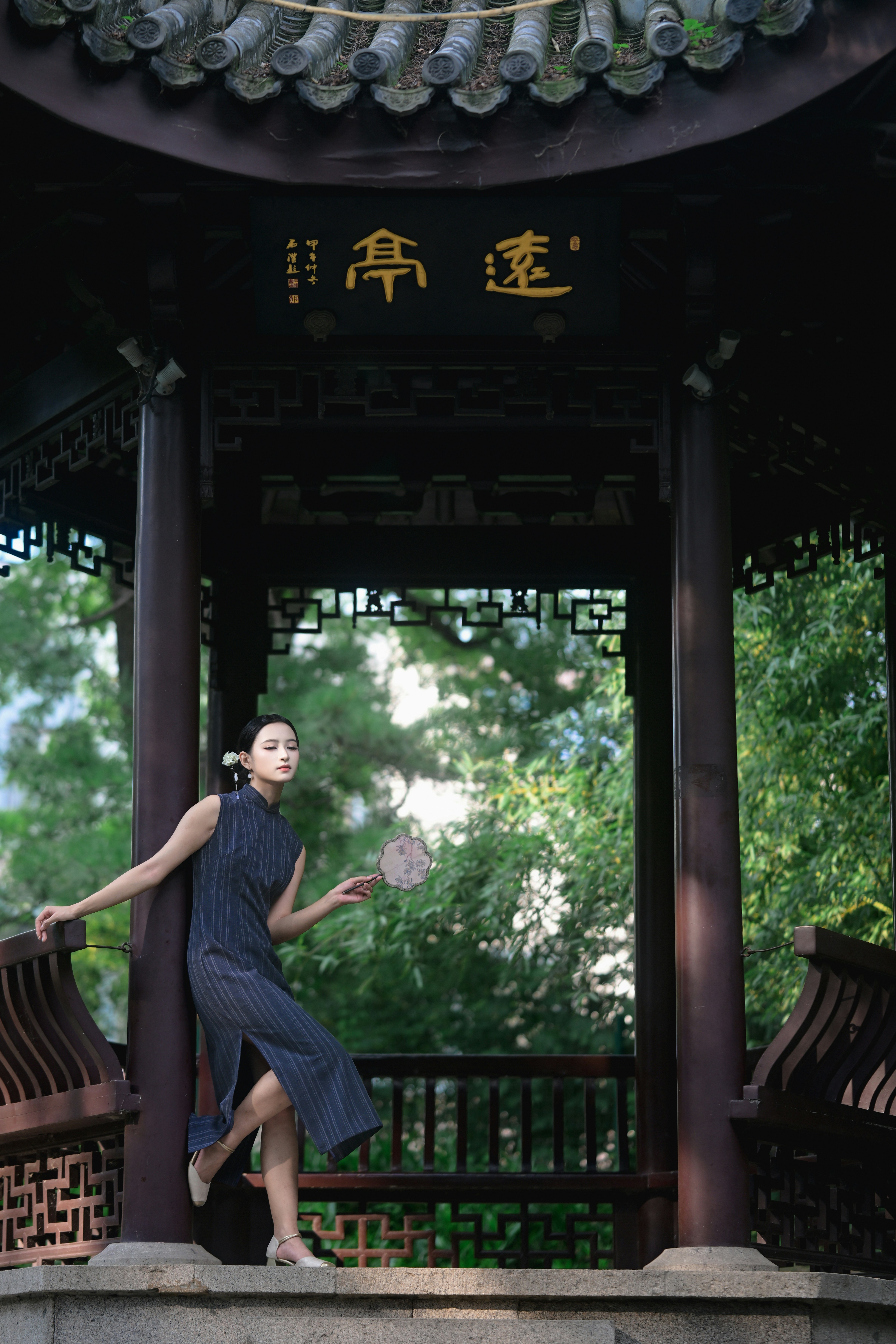 Grace Under the Pavilion: A Quiet Portrait in a Traditional Chinese Garden