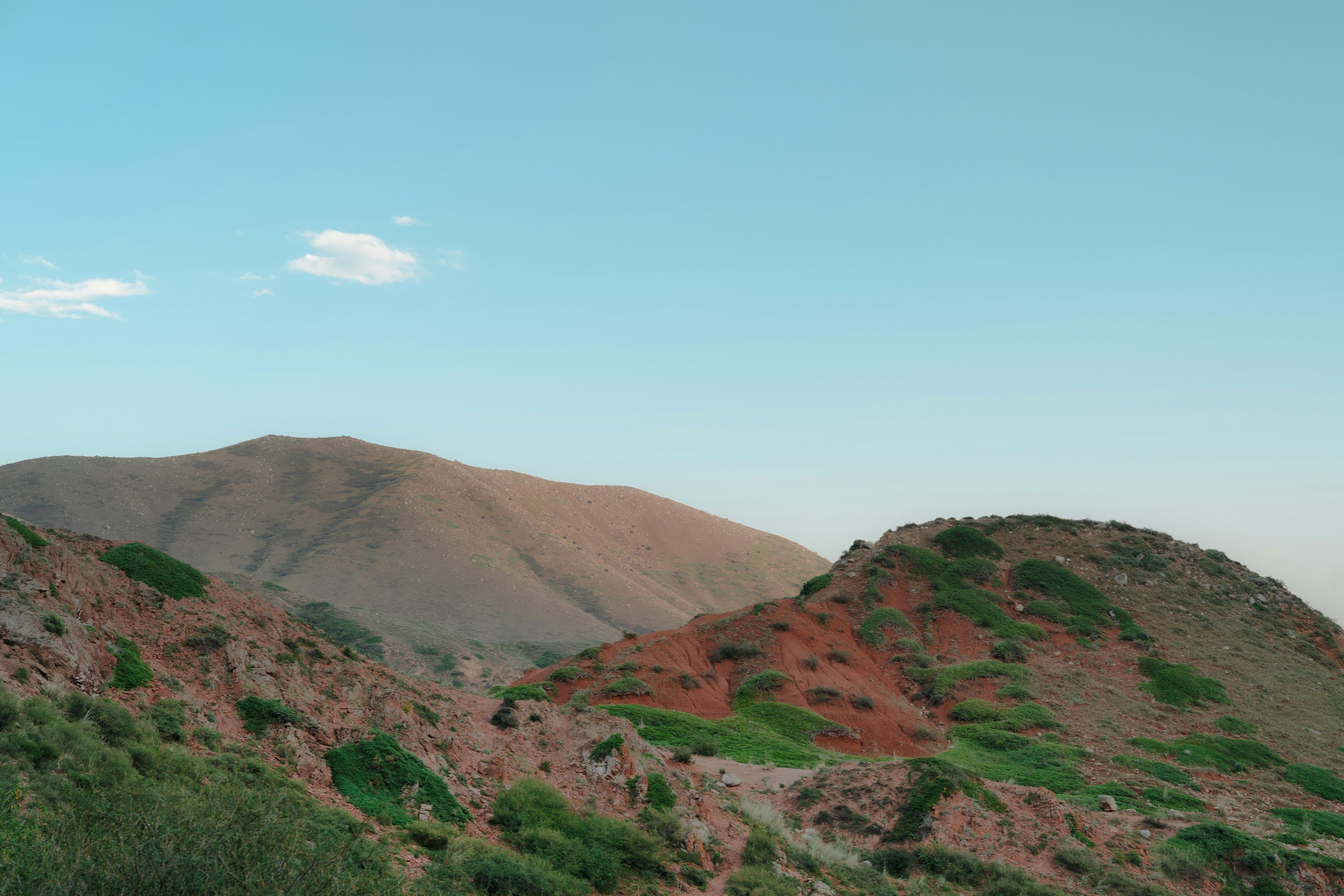 Red-Cilled Ridge at Dusk: A Desert Landscape Unfolds