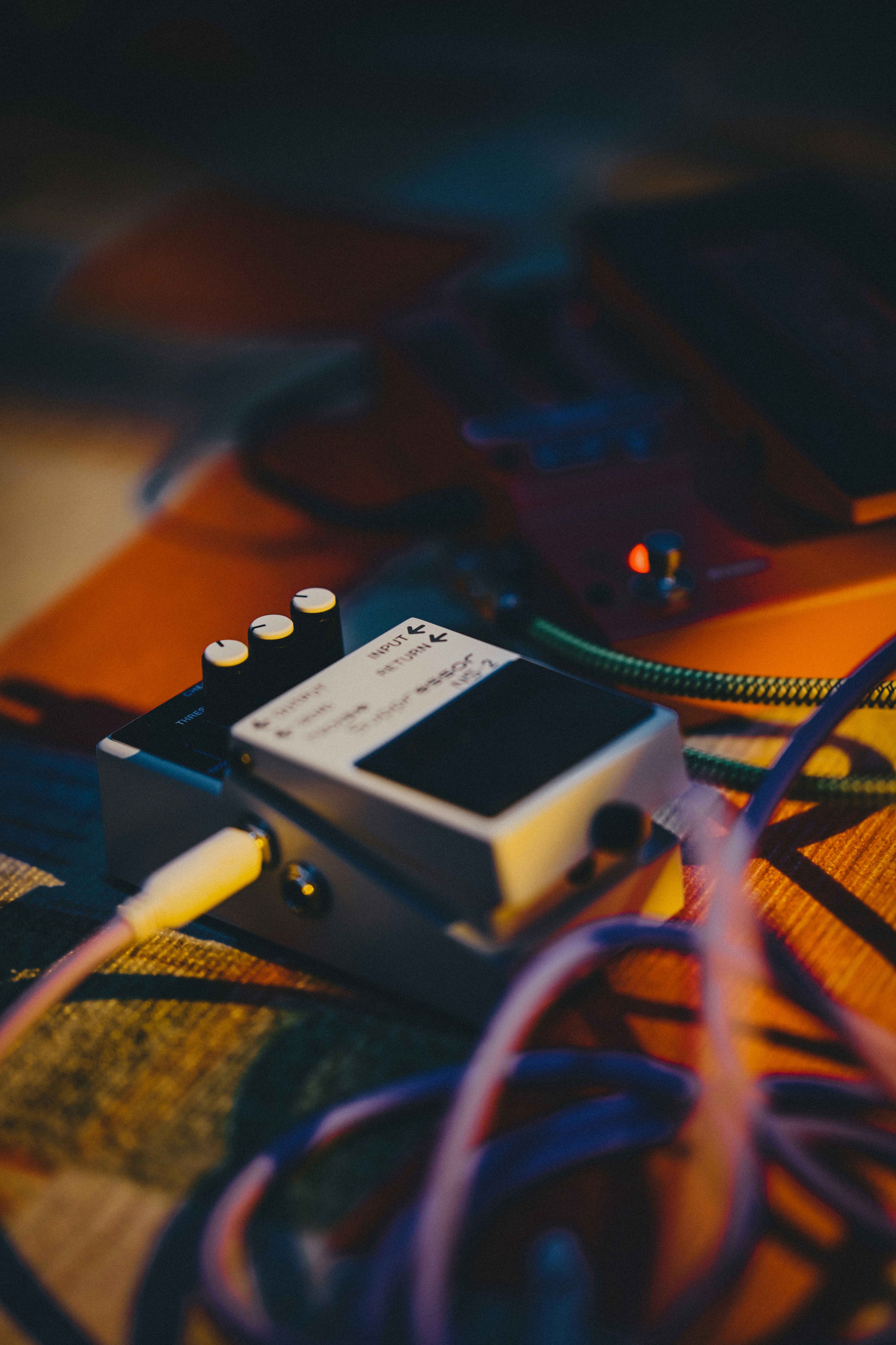 Soft Neon Rhythms: An Audio Patchboard in Focus