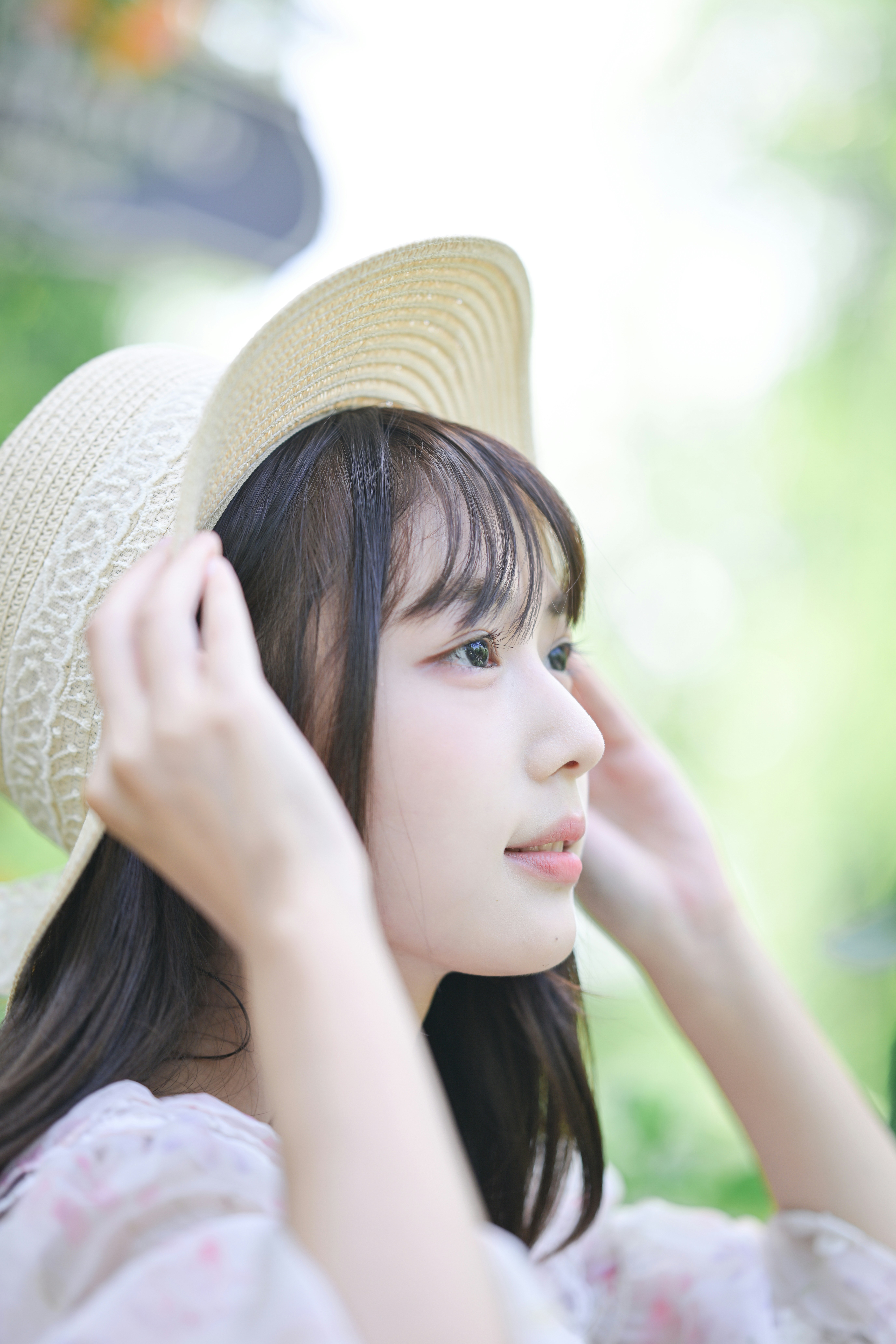 Sunlit Portrait in a Straw Hat