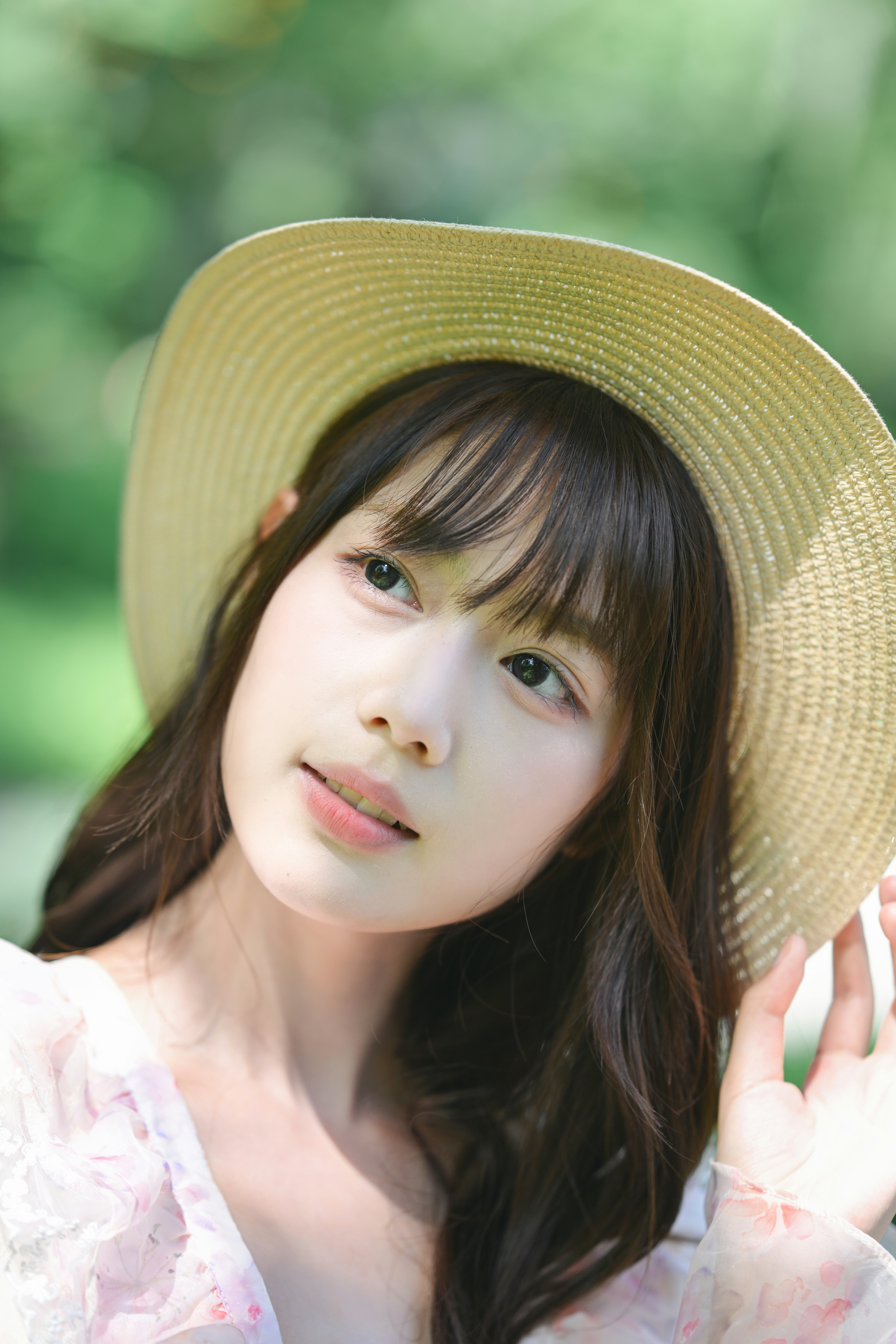 Sunlit Hat: Portrait of Quiet Light in a Garden Moment