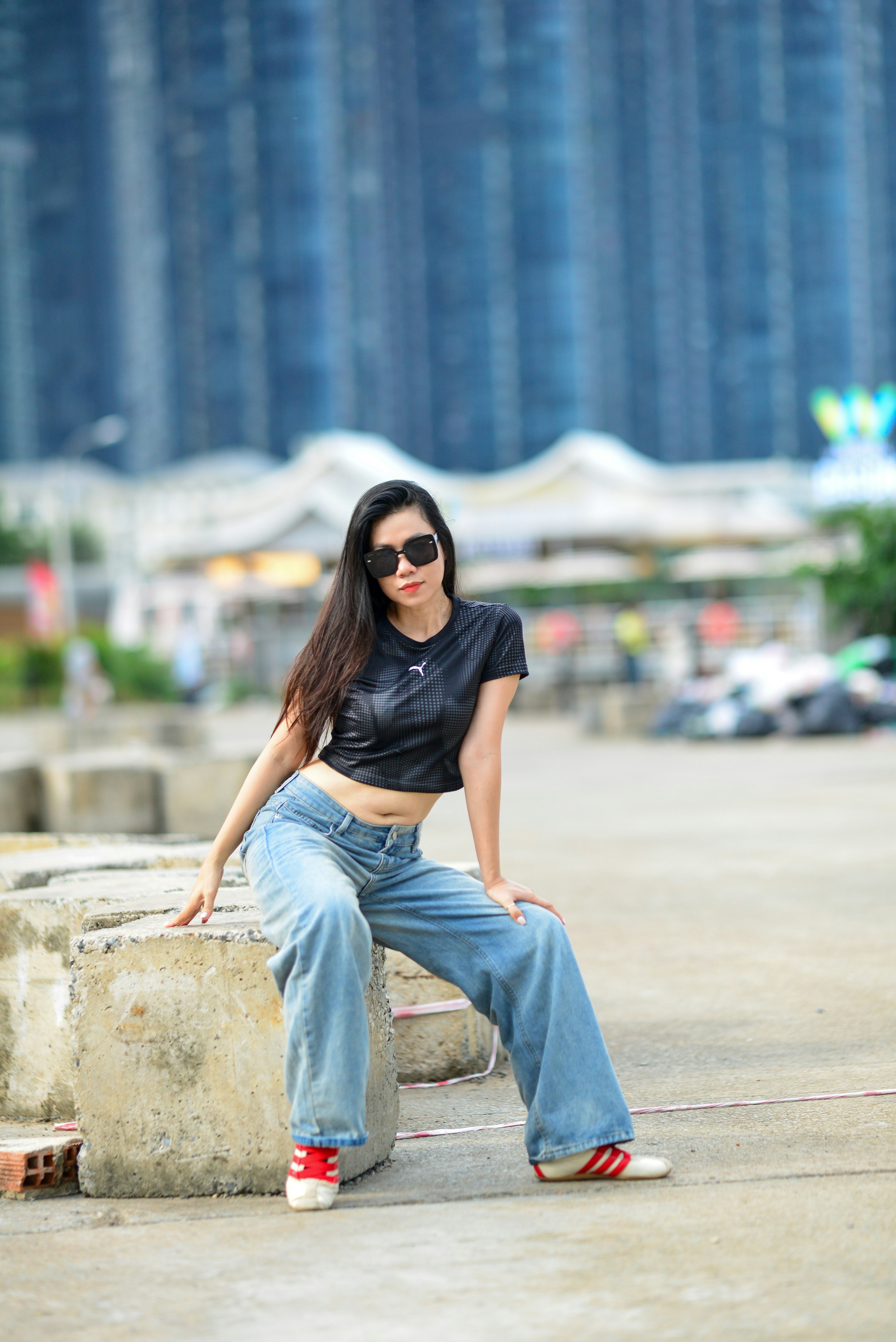 Urban Edge: A confident pose in denim and leather