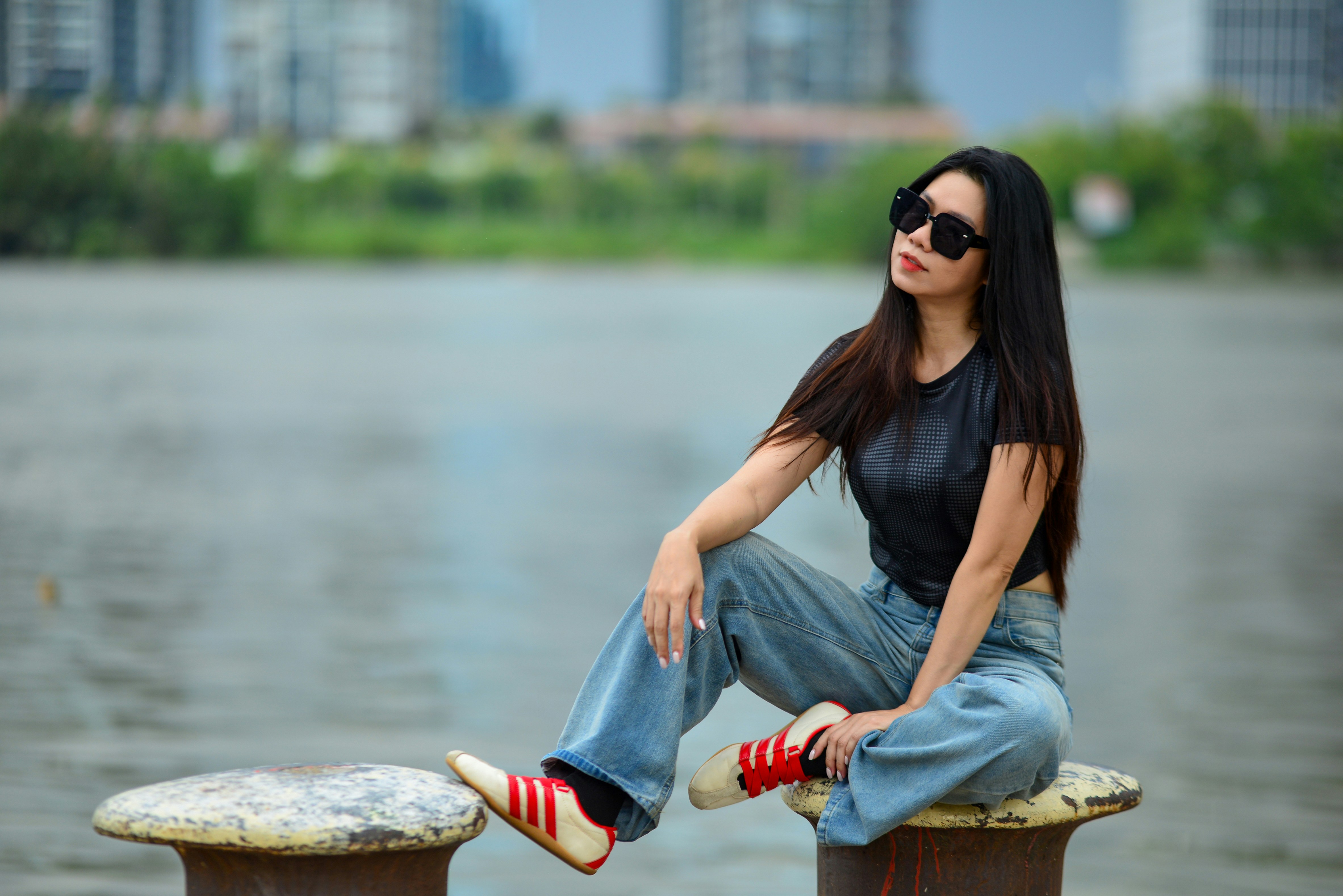 Sunglassed Solitude by the Riverbank