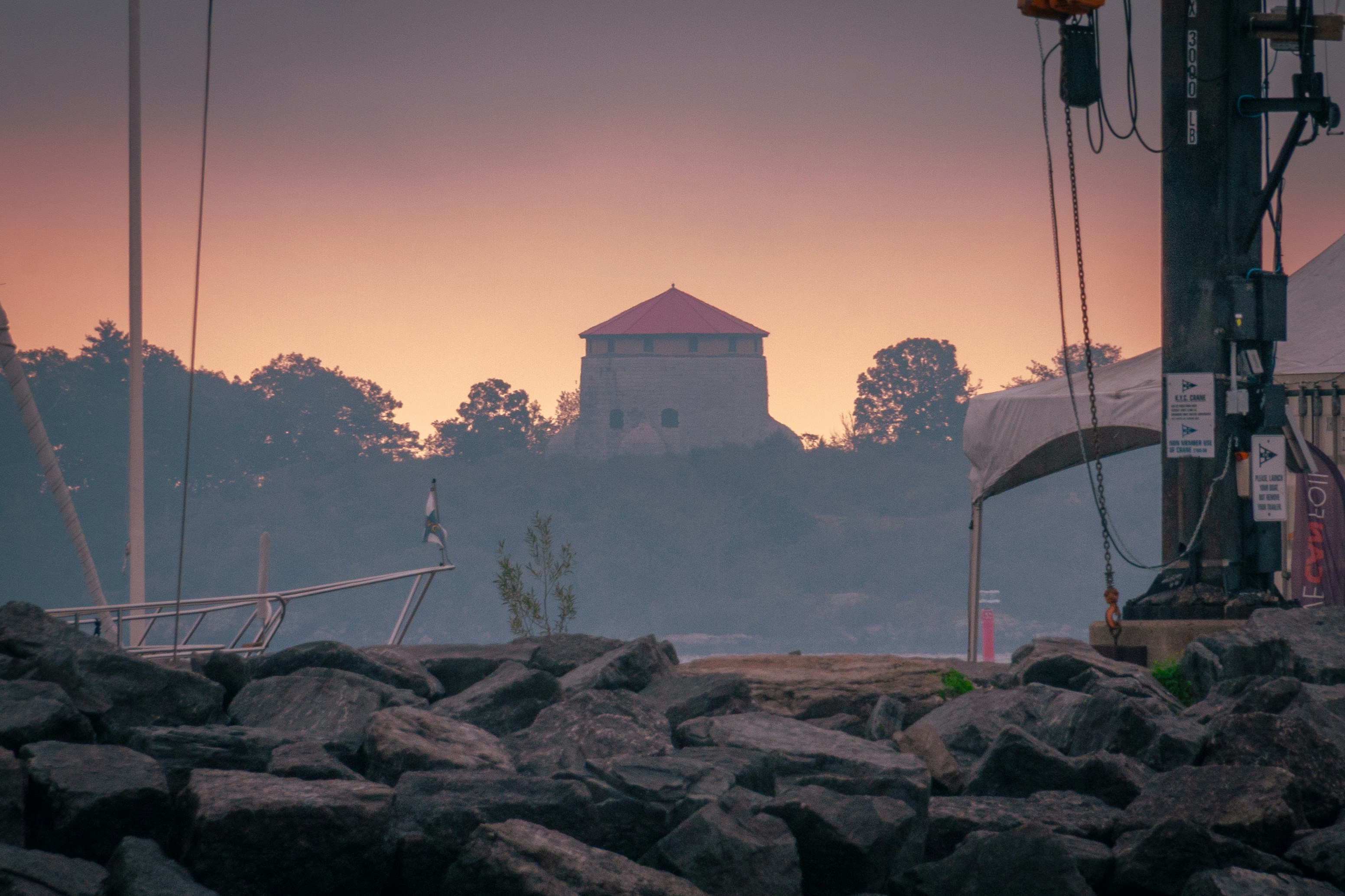 Rising Sun Over the Wharf: A Quiet Maritime Silhouette