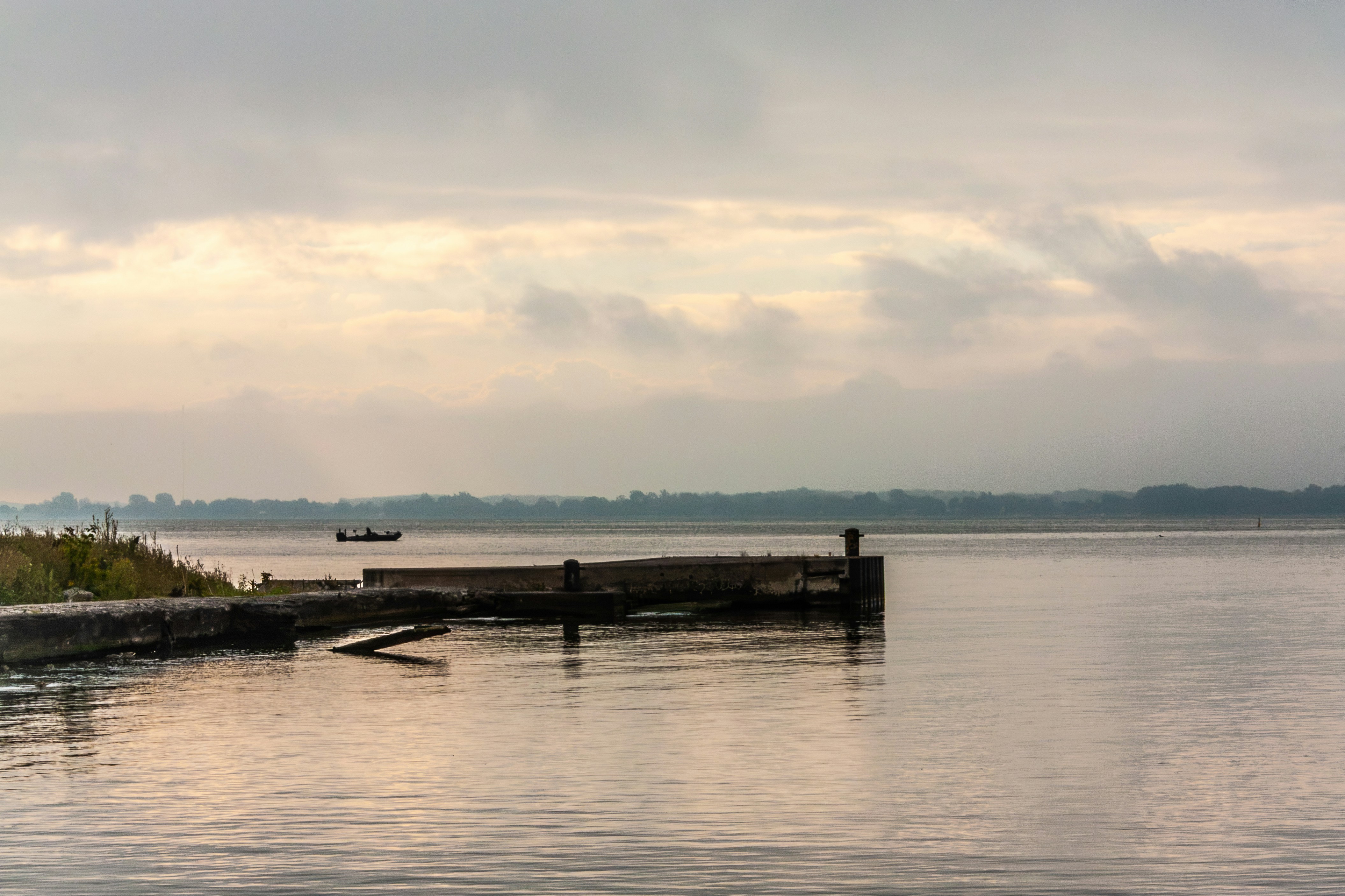 Quiet Pier at Dusk: A Calm Waterline Echoes the Evening Sky