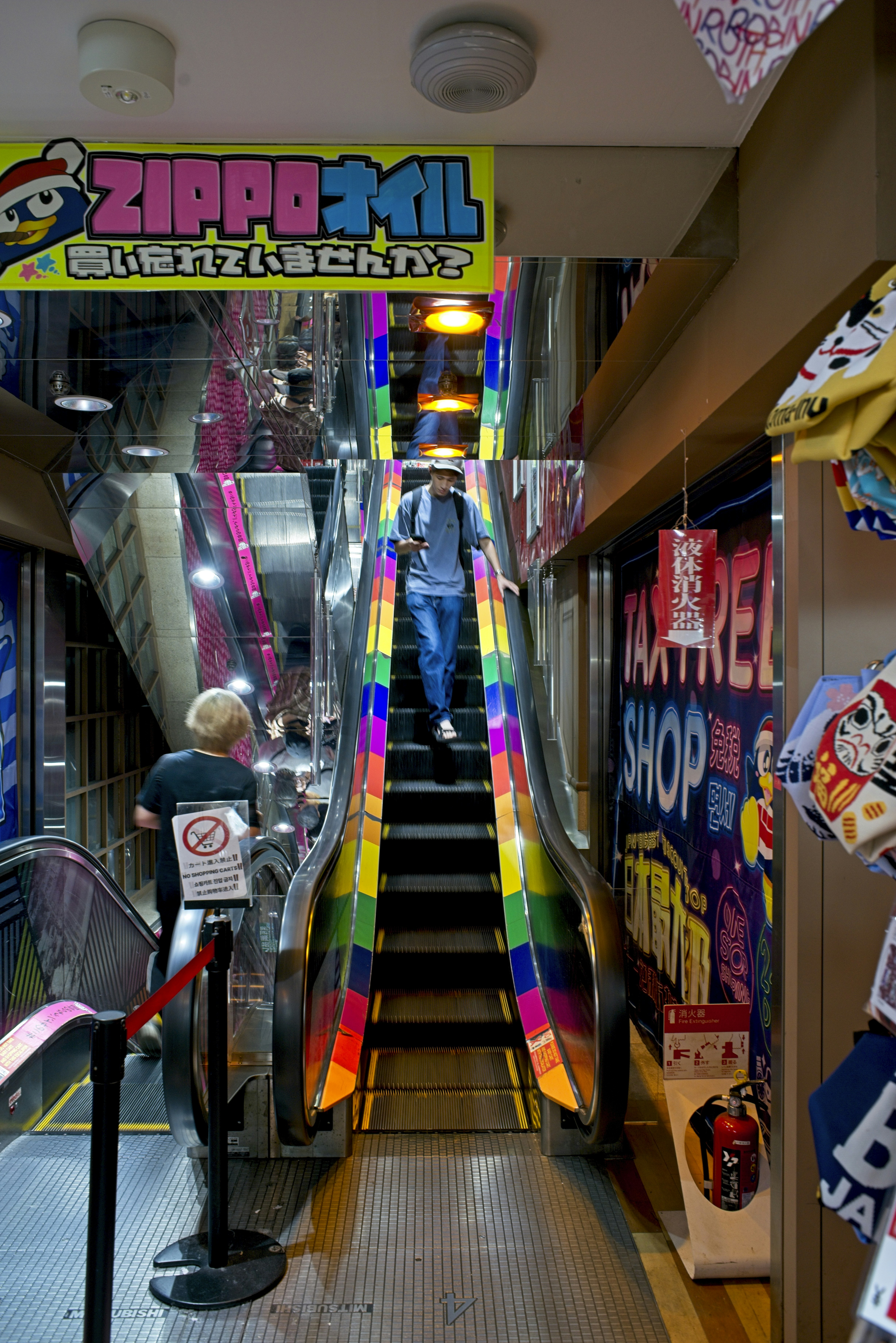 Rainbow Escalator to Neon Tokyo: A Bustling Arcade Moment