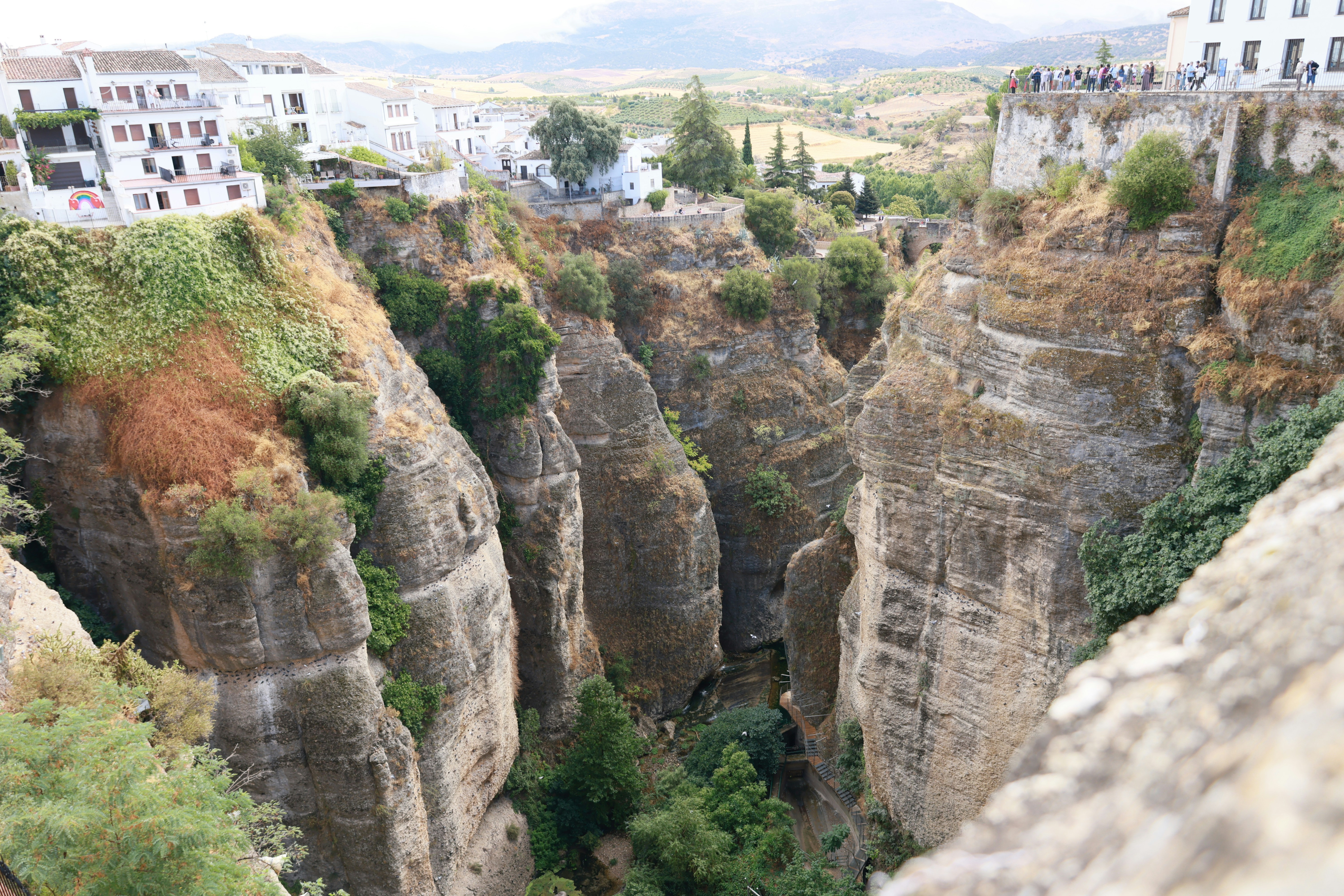 Canyon of Carved Cliffs Meets Village Edge