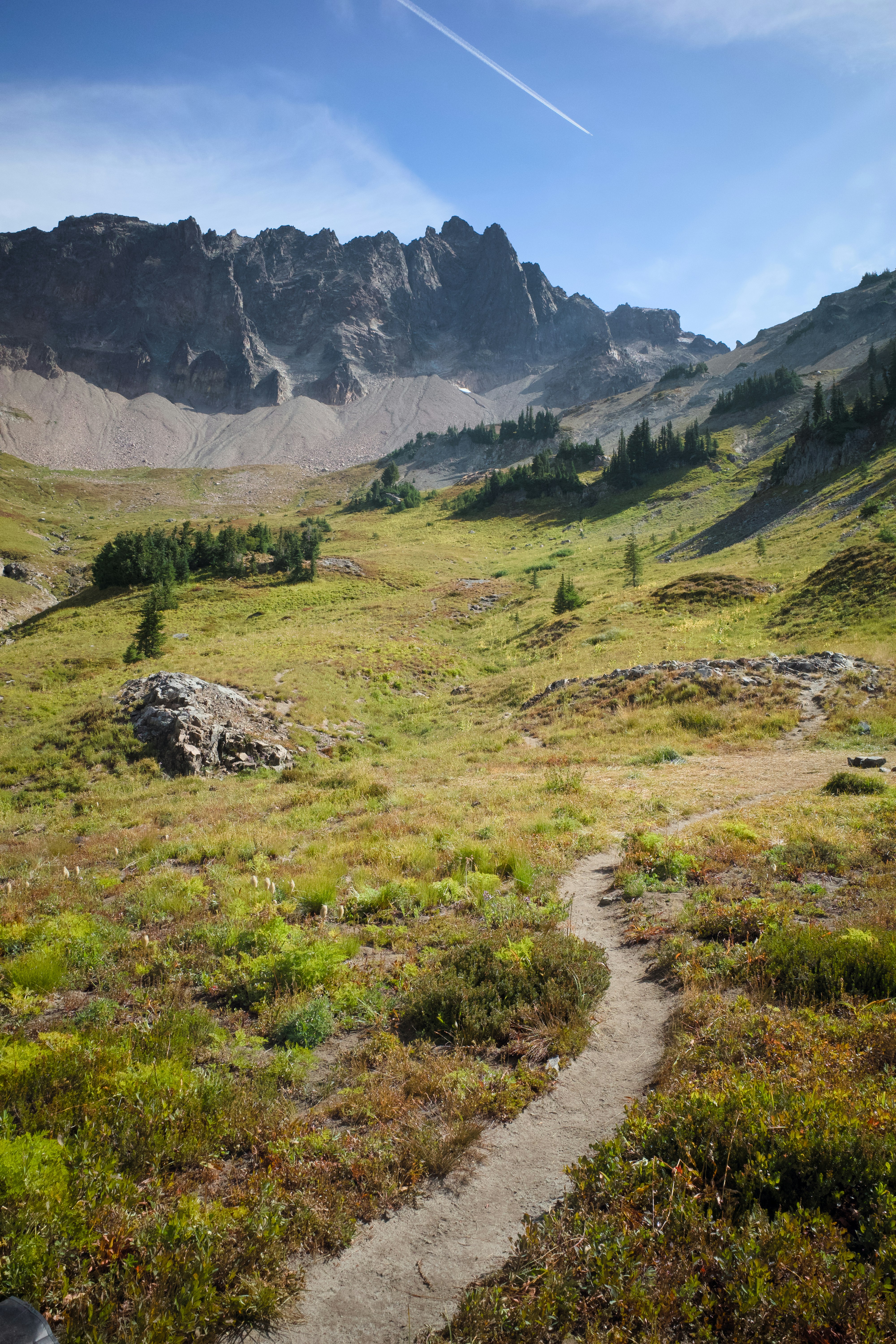 Trail to the jagged alpine skyline