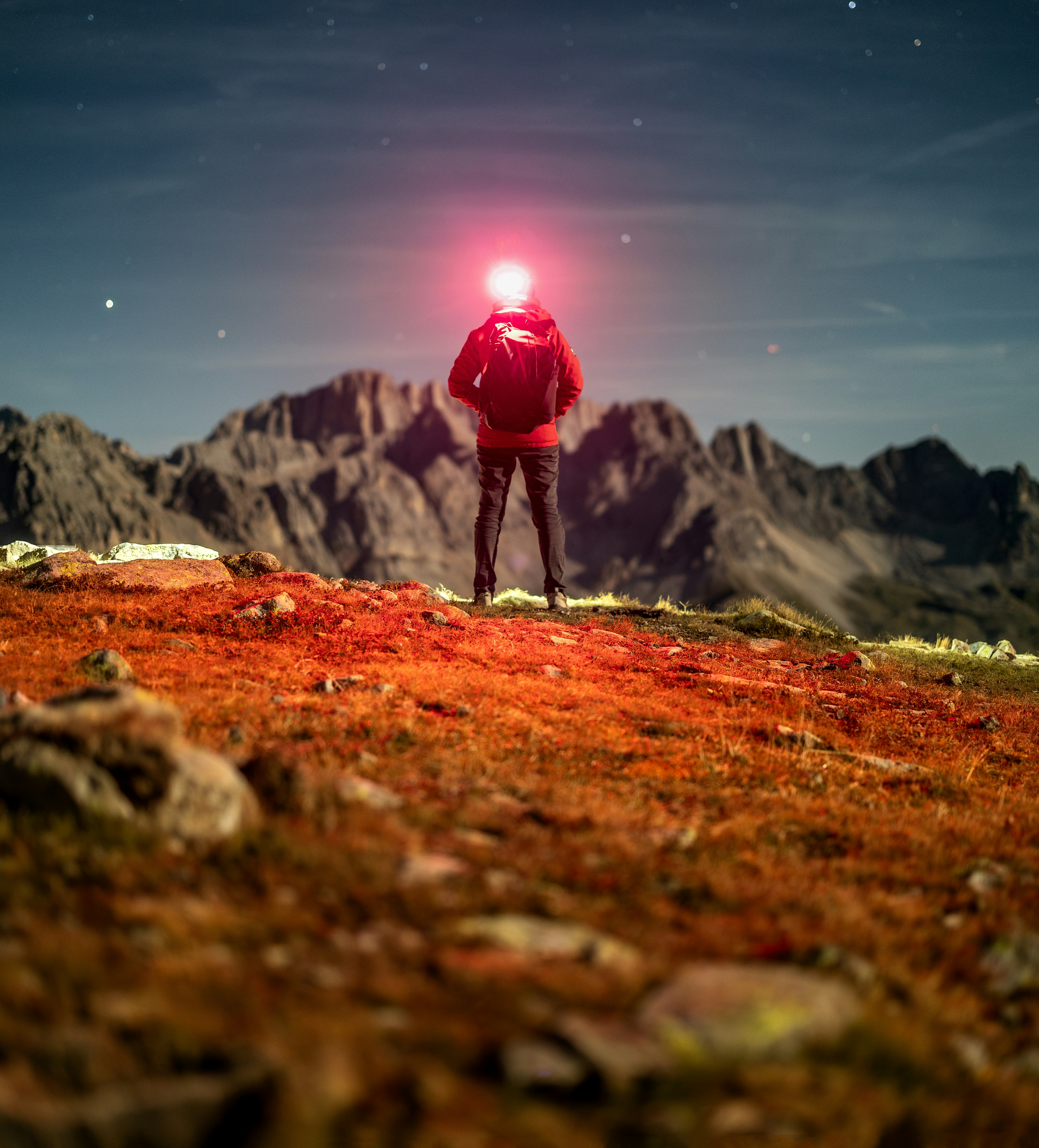 Limiter of Light: A Lone Explorer Beneath Alpine Skies