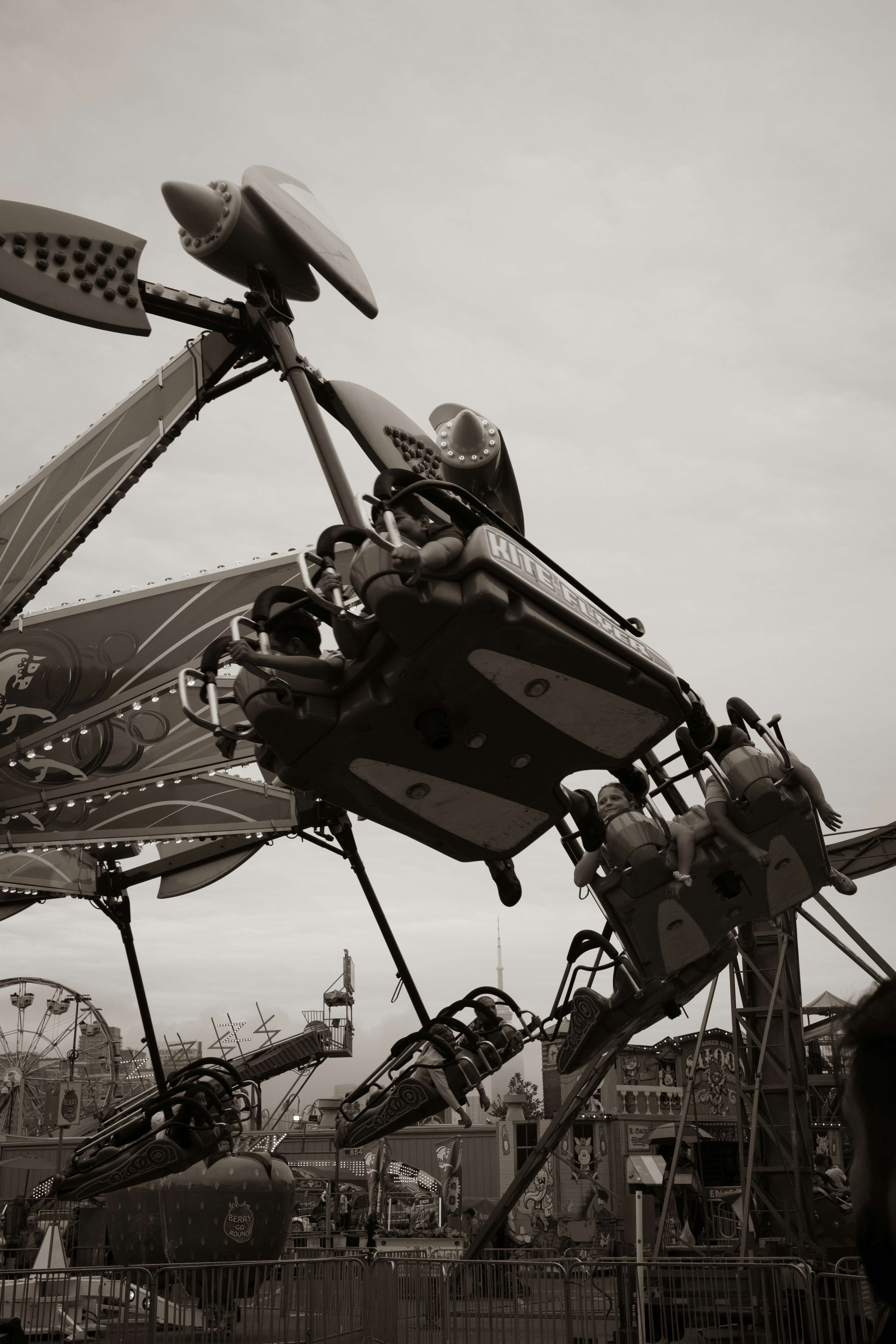 Midair Thrill: Riders Dizzy in a Giant Swing Ride
