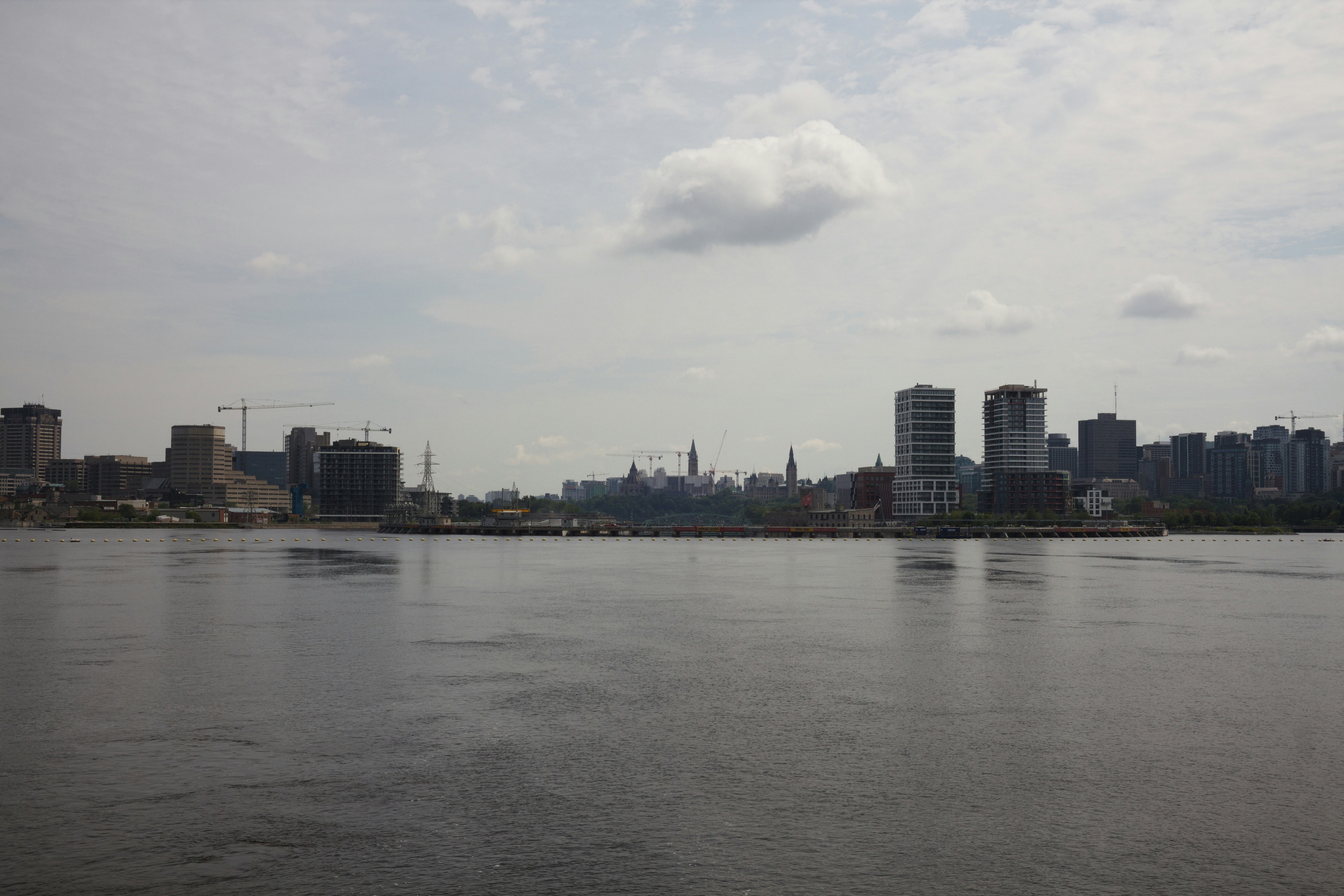 City Skyline Crossing the River at Dusk