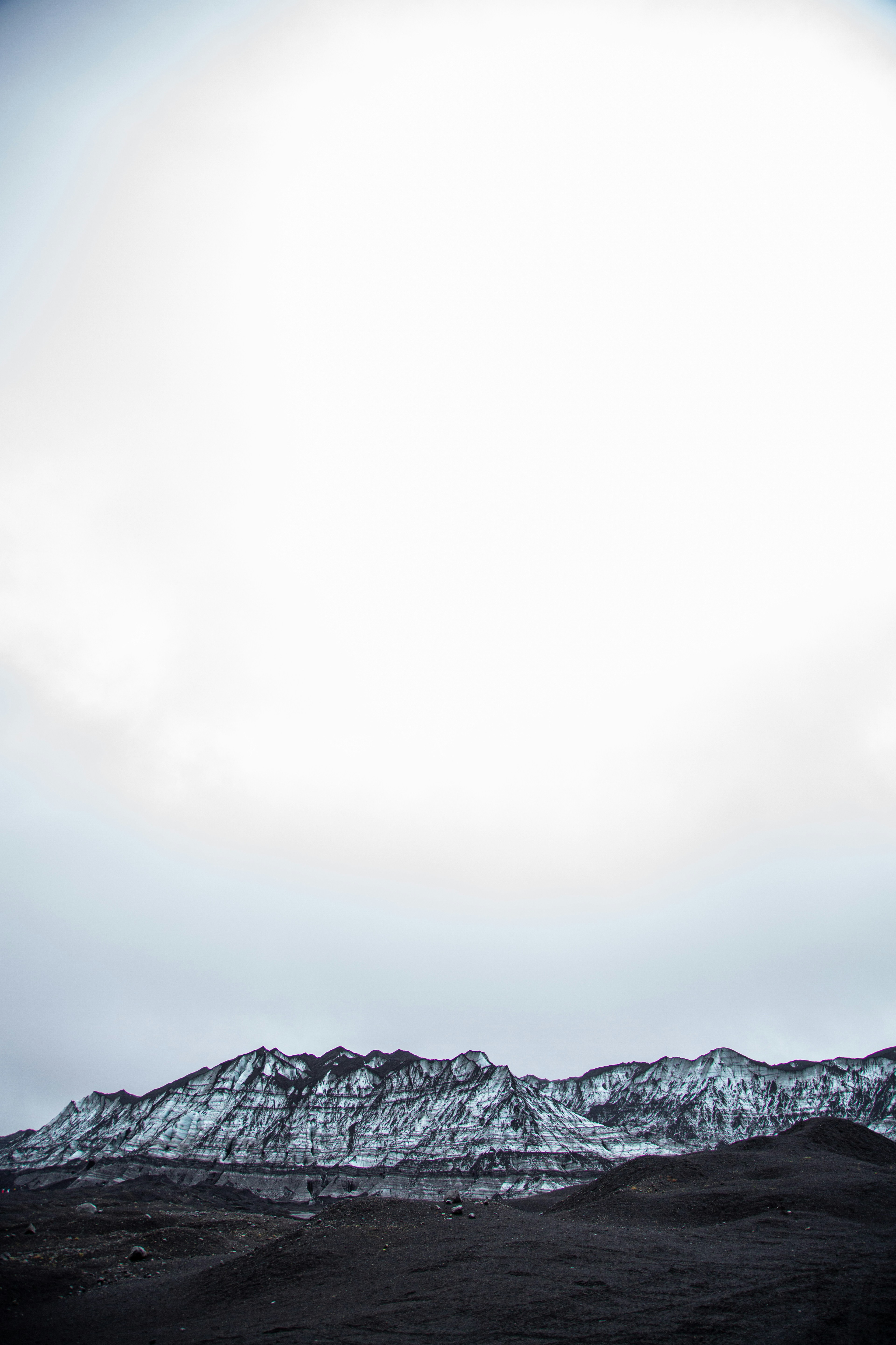 Bright Sky Over Dark Basalt Ridge