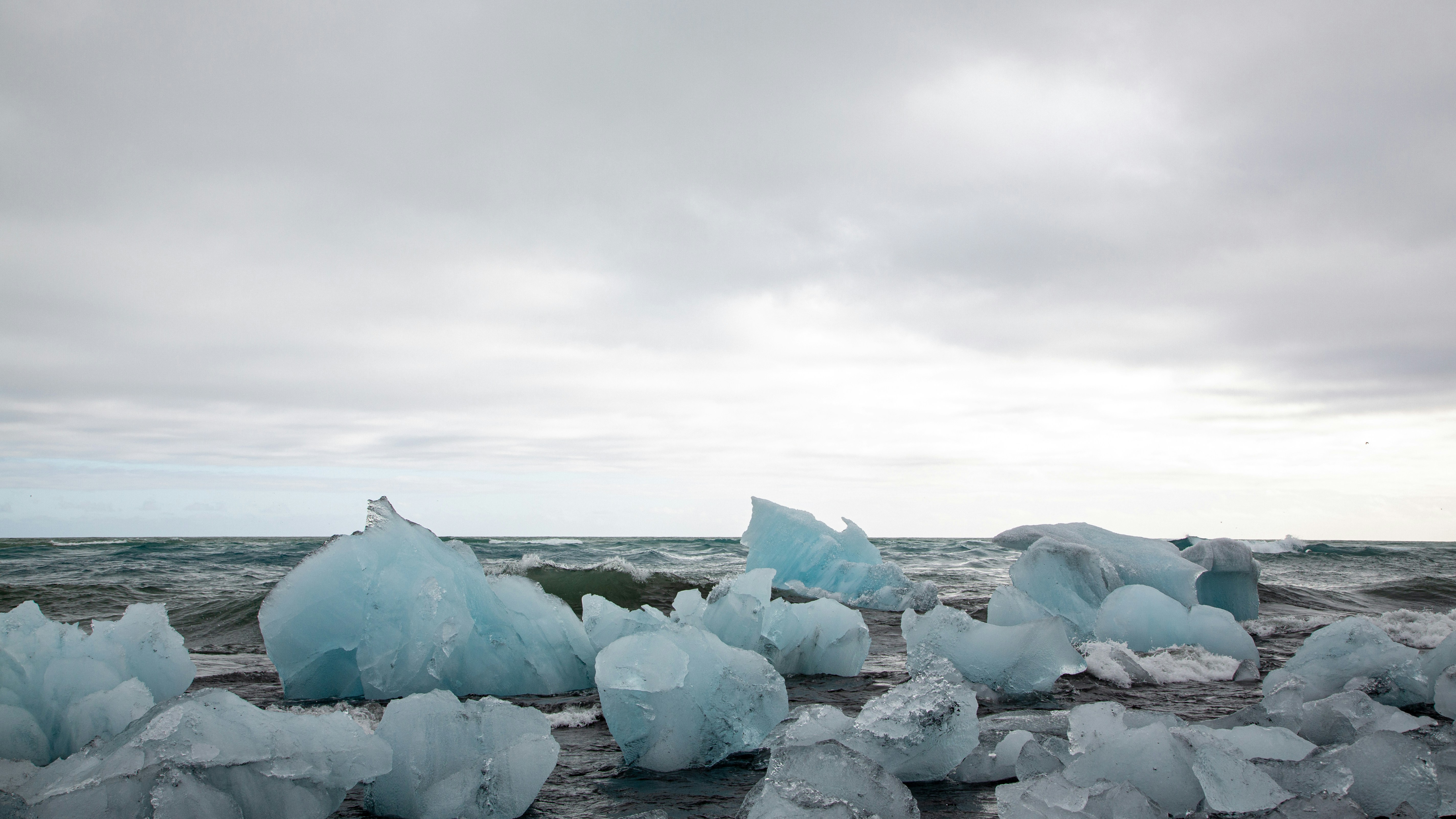 Icebound Seascape: Fractured Blue on a Distant Horizon