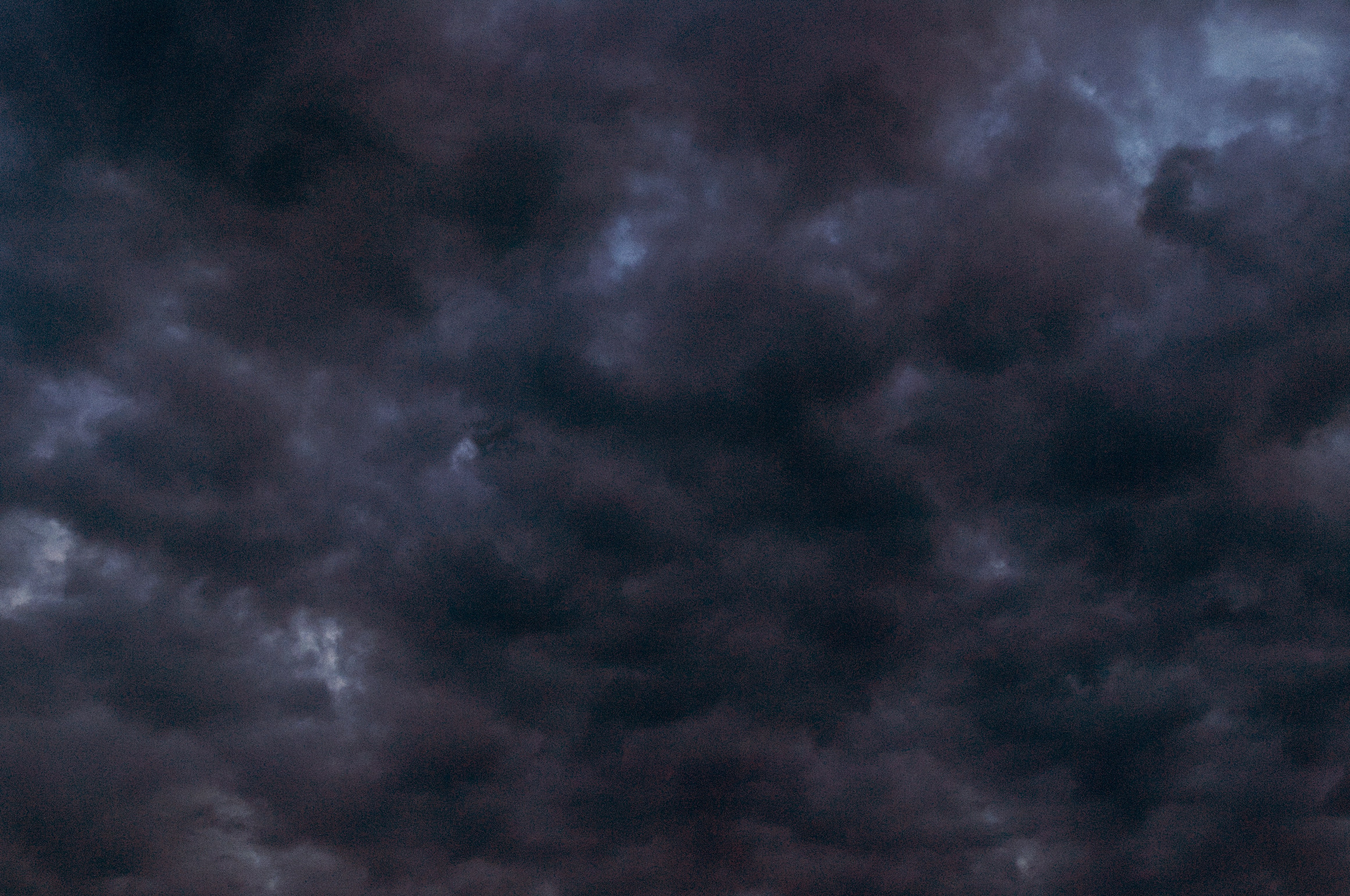 Midnight Tempest: A Rich Tapestry of Distant Storm Clouds