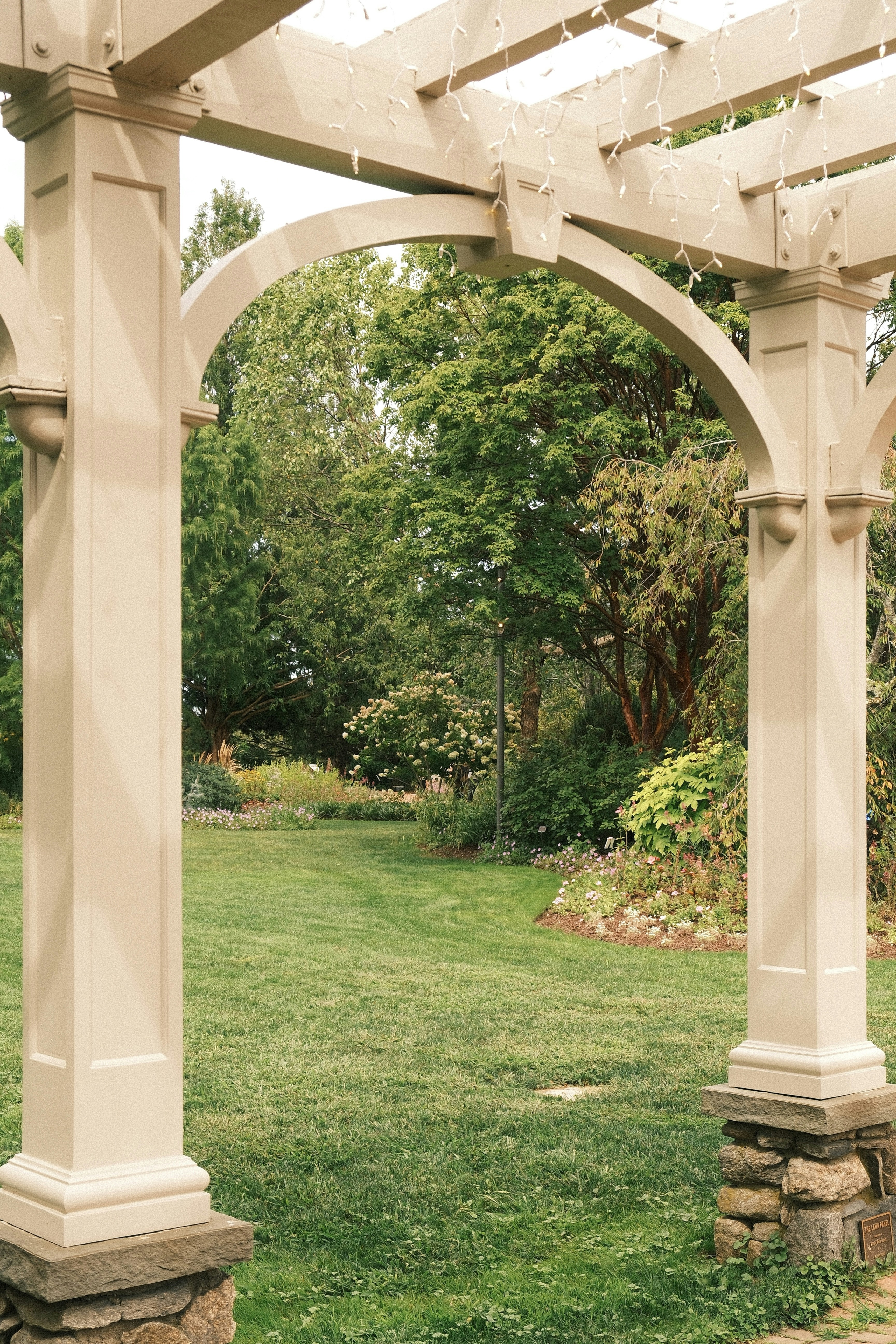 Garden Archway Framed by Verdant Archways
