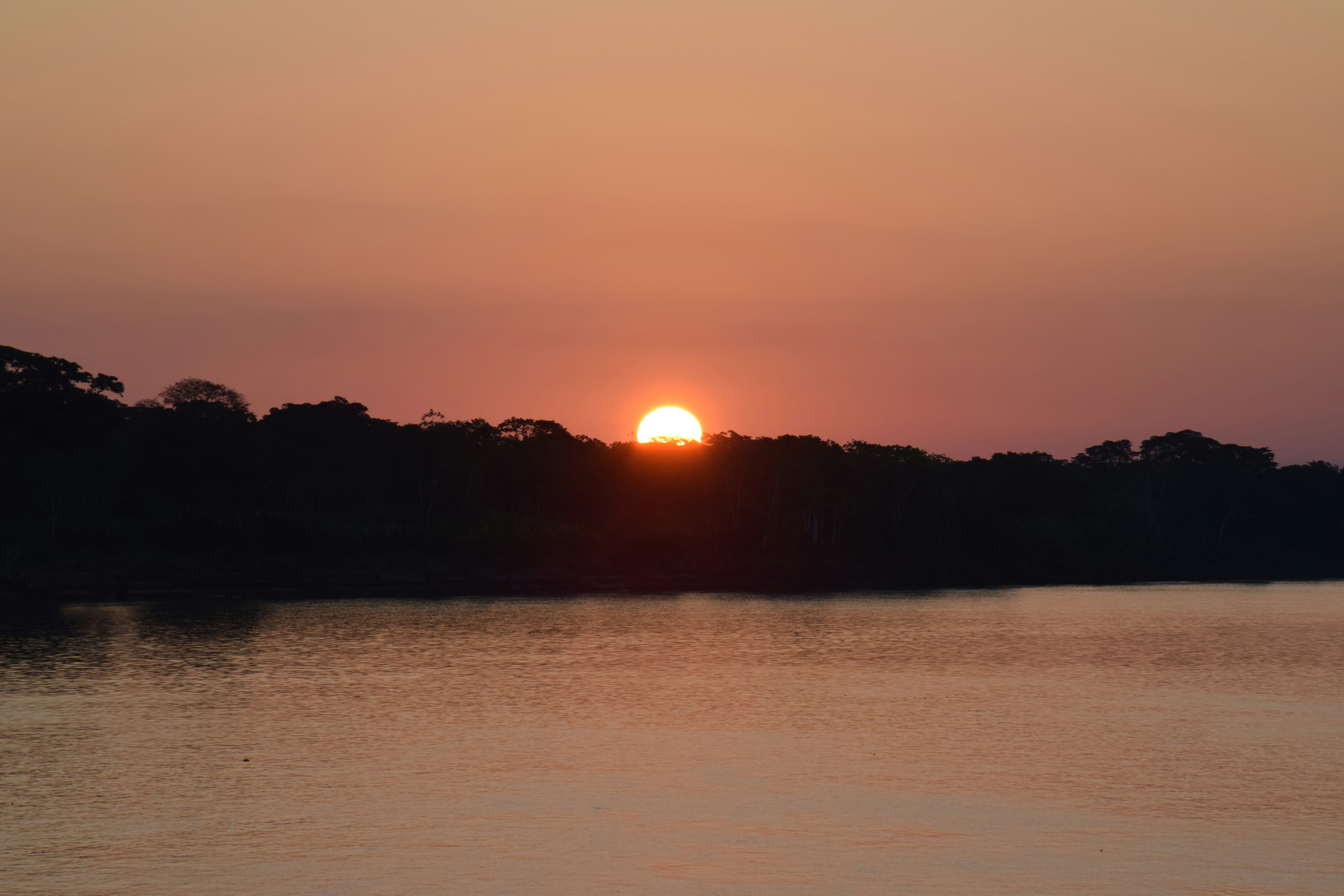 Quiet Sunset Over a Silenced Riverbank