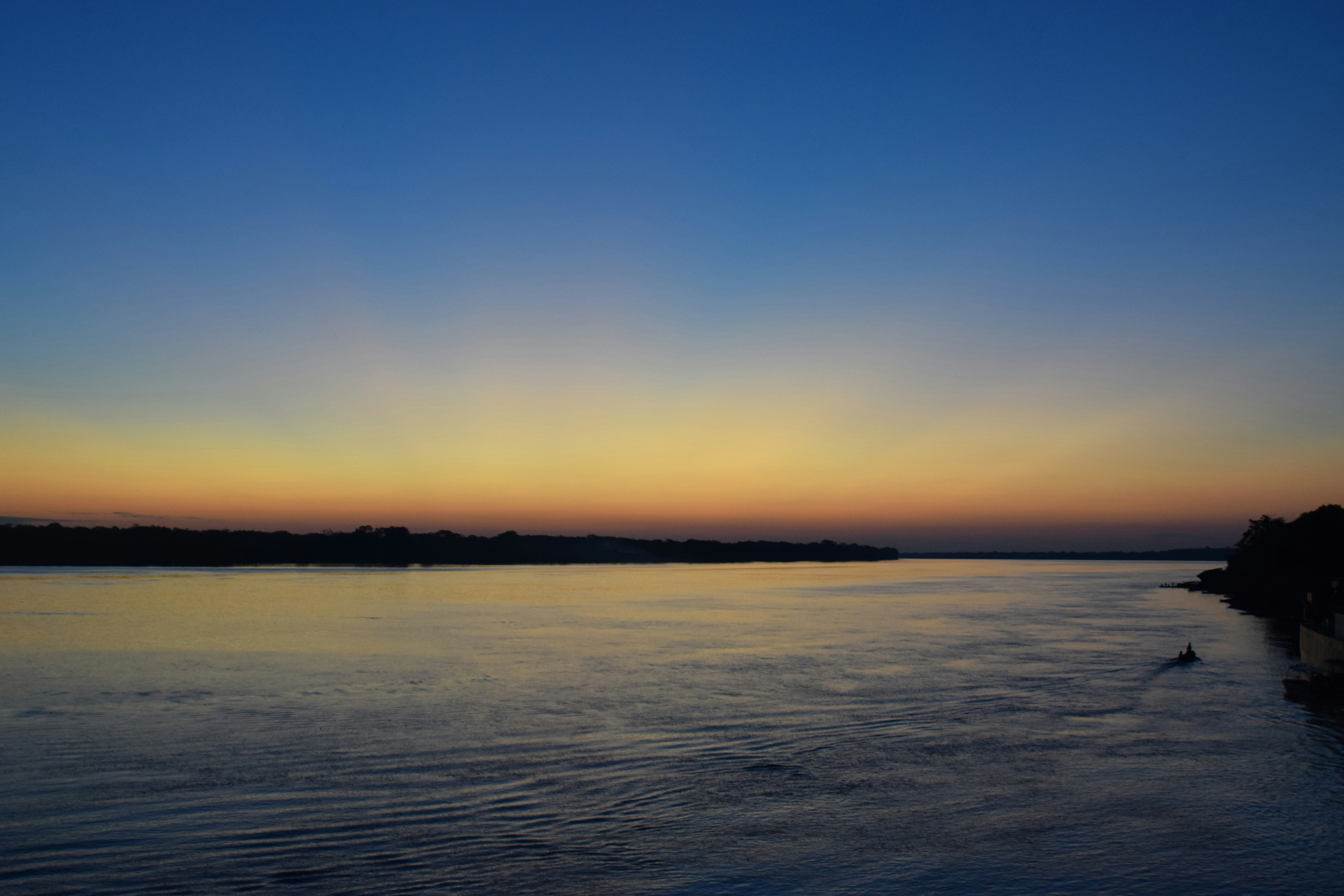 Dawn Over the River: A Quiet Horizon