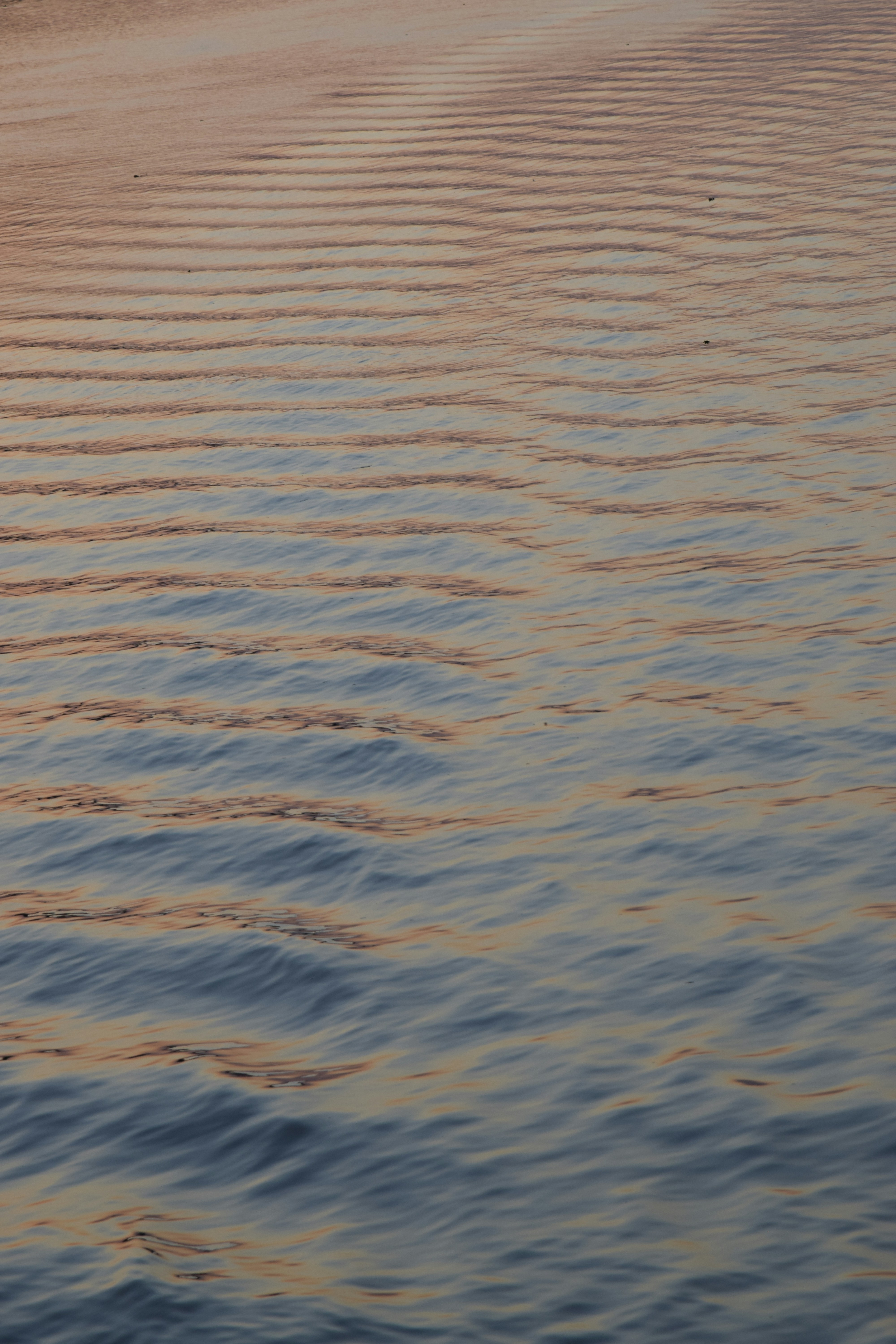 Sunset Ripples Over Quiet Waters